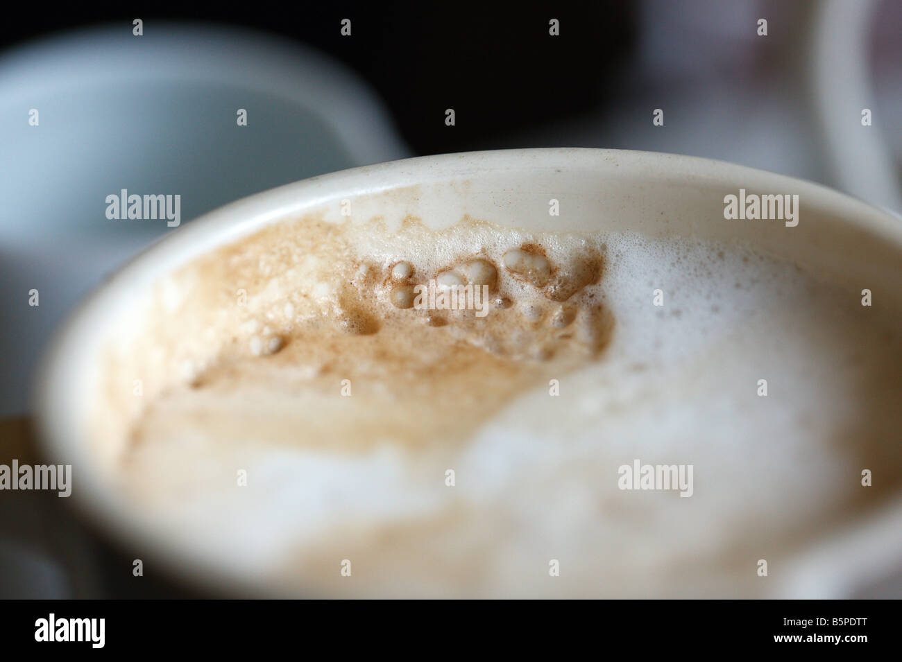 Mug of frothy Latte coffee Stock Photo - Alamy