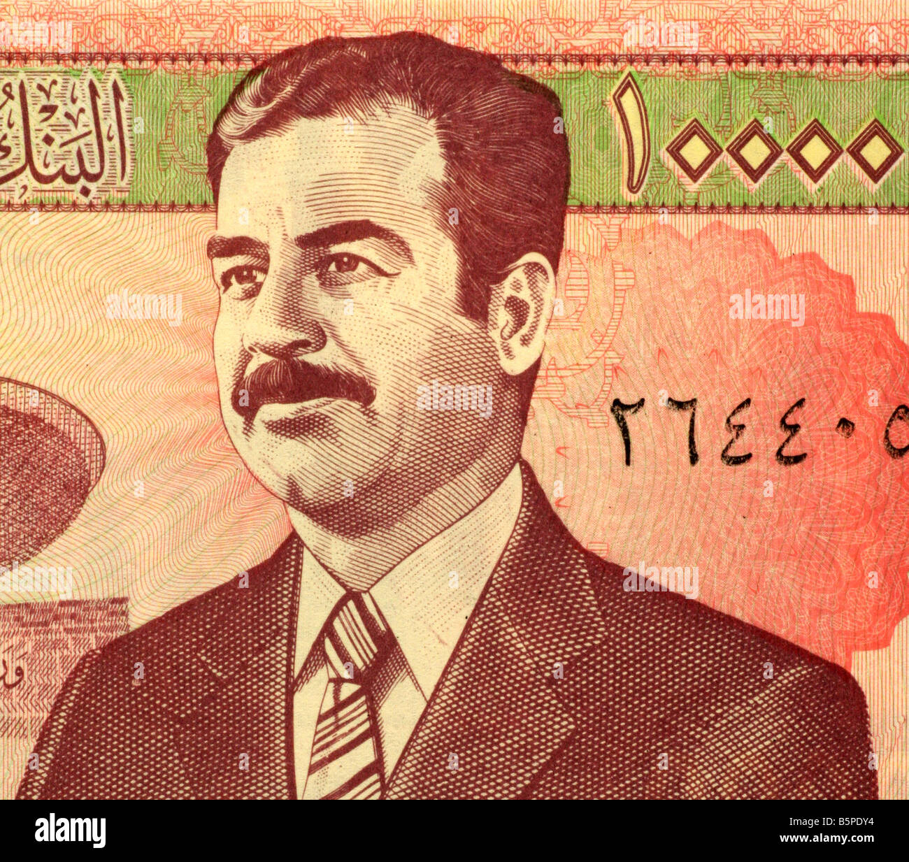 Saddam Hussein on 10 000 dinars banknote from Iraq Stock Photo - Alamy
