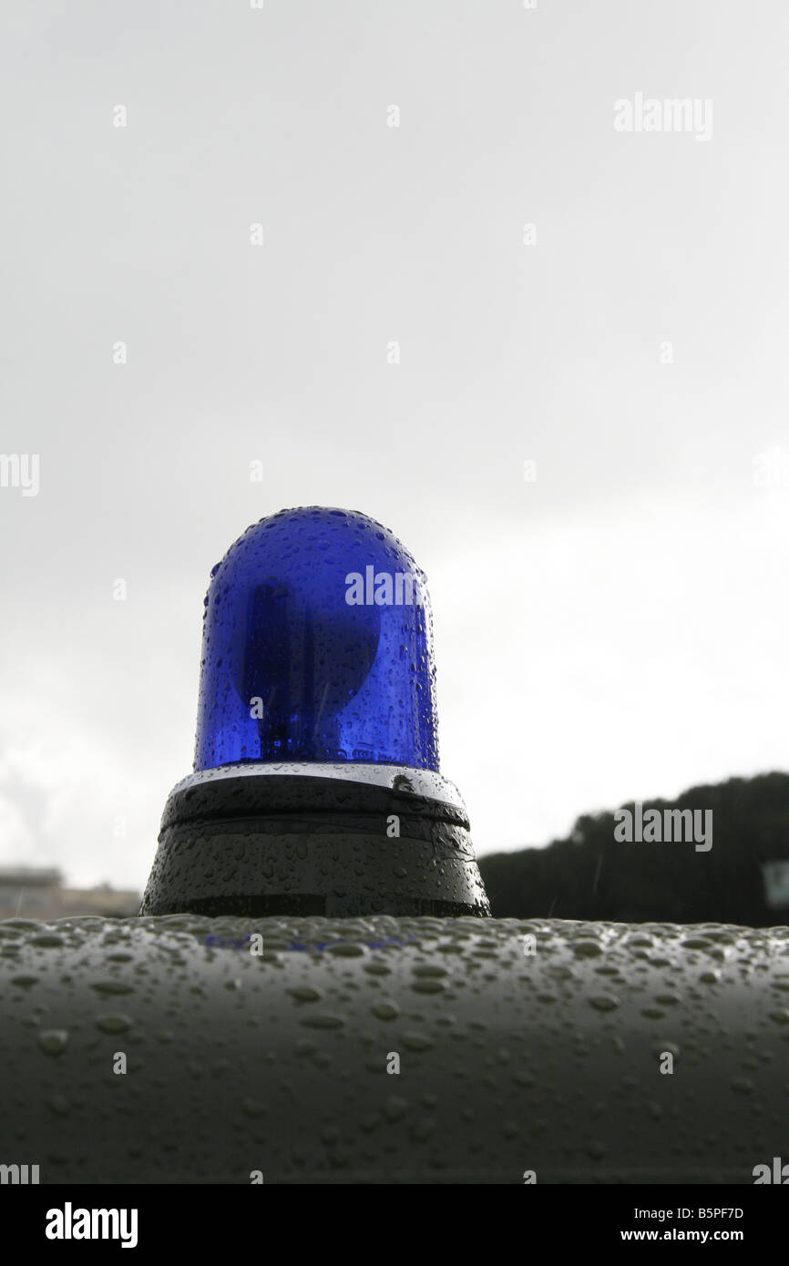 emergency services blue light on police car Stock Photo - Alamy