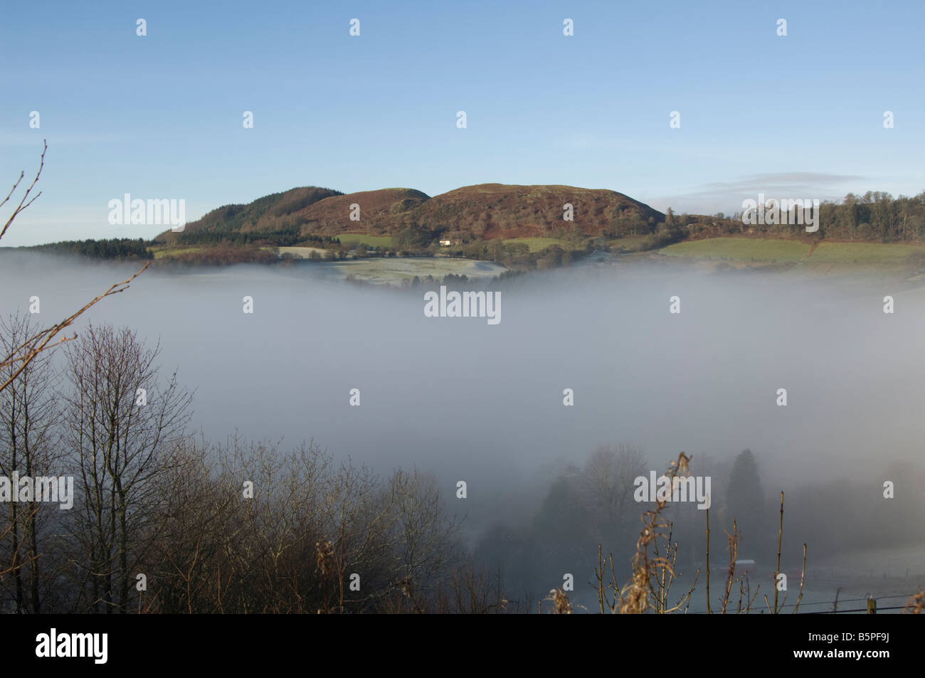Mist in the valley on the approach to Lake Vyrnwy, North Wales Stock ...