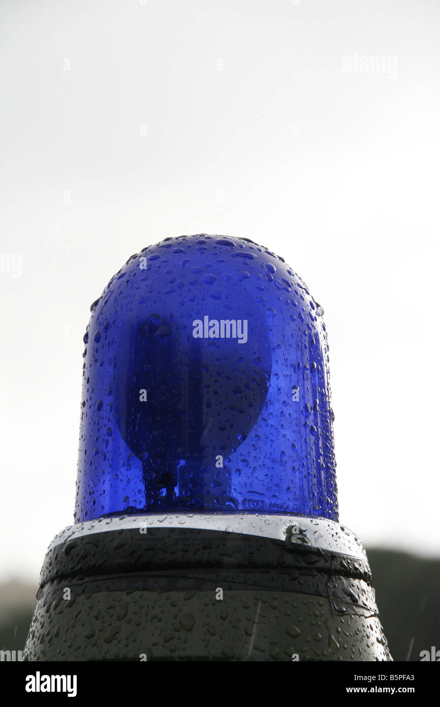 emergency services blue light on police car Stock Photo - Alamy