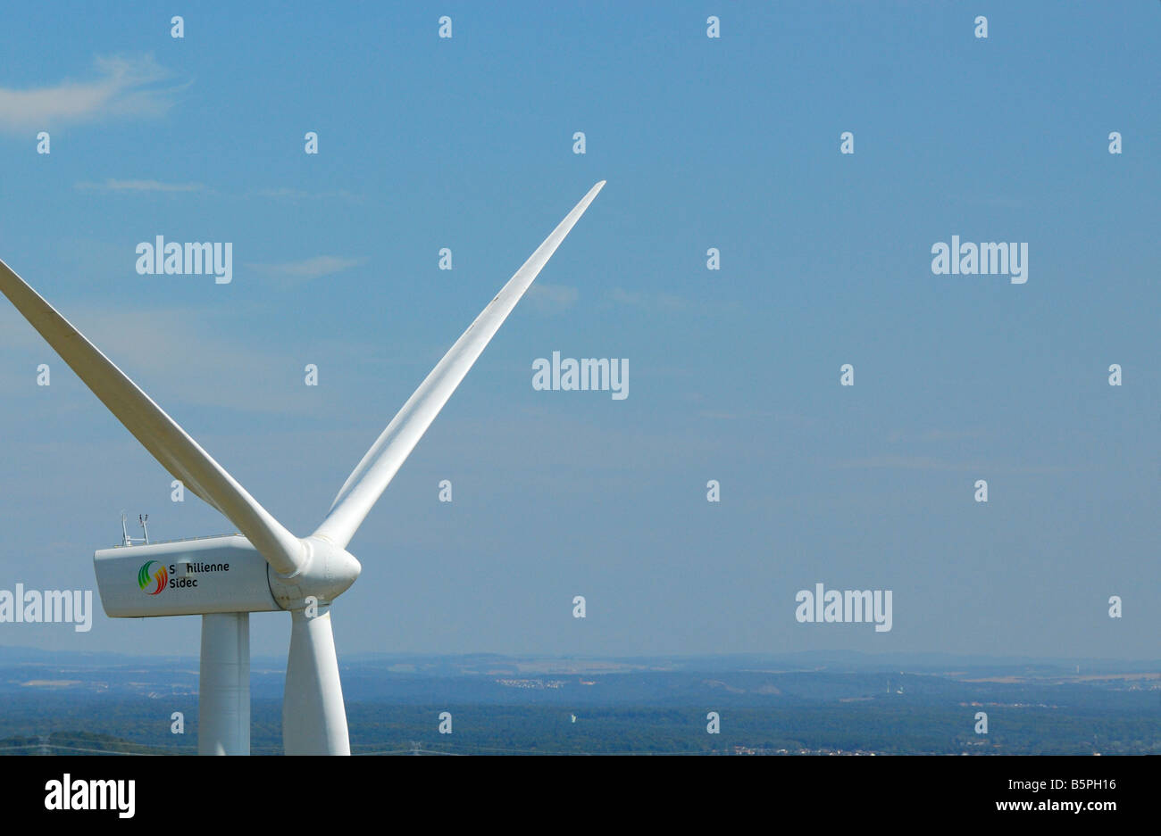 A close up of an alternator of a windturbine on blue sky - France Stock ...