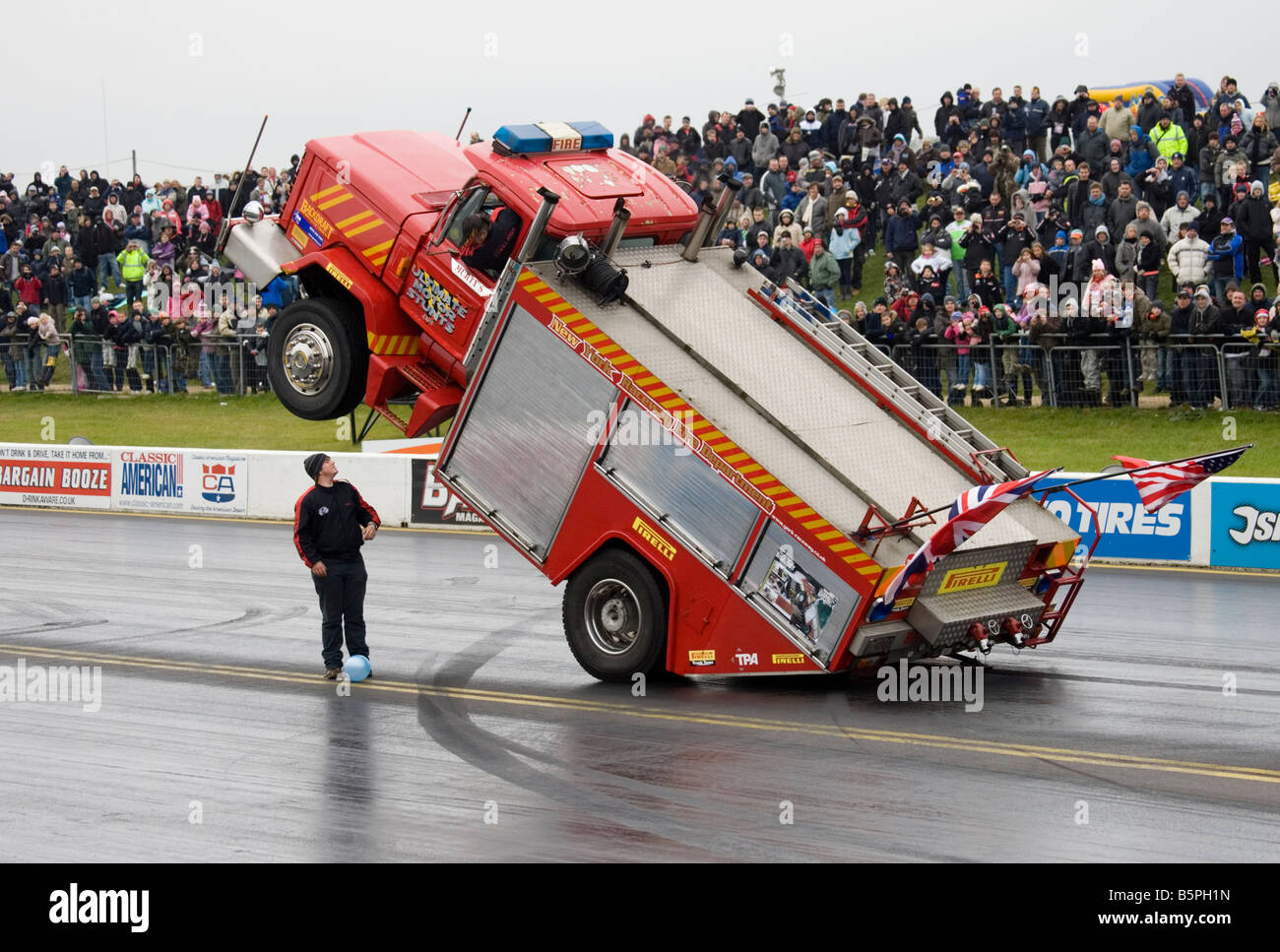 Backdraft wheelie firetruck on two wheels at Santa Pod, England Stock ...