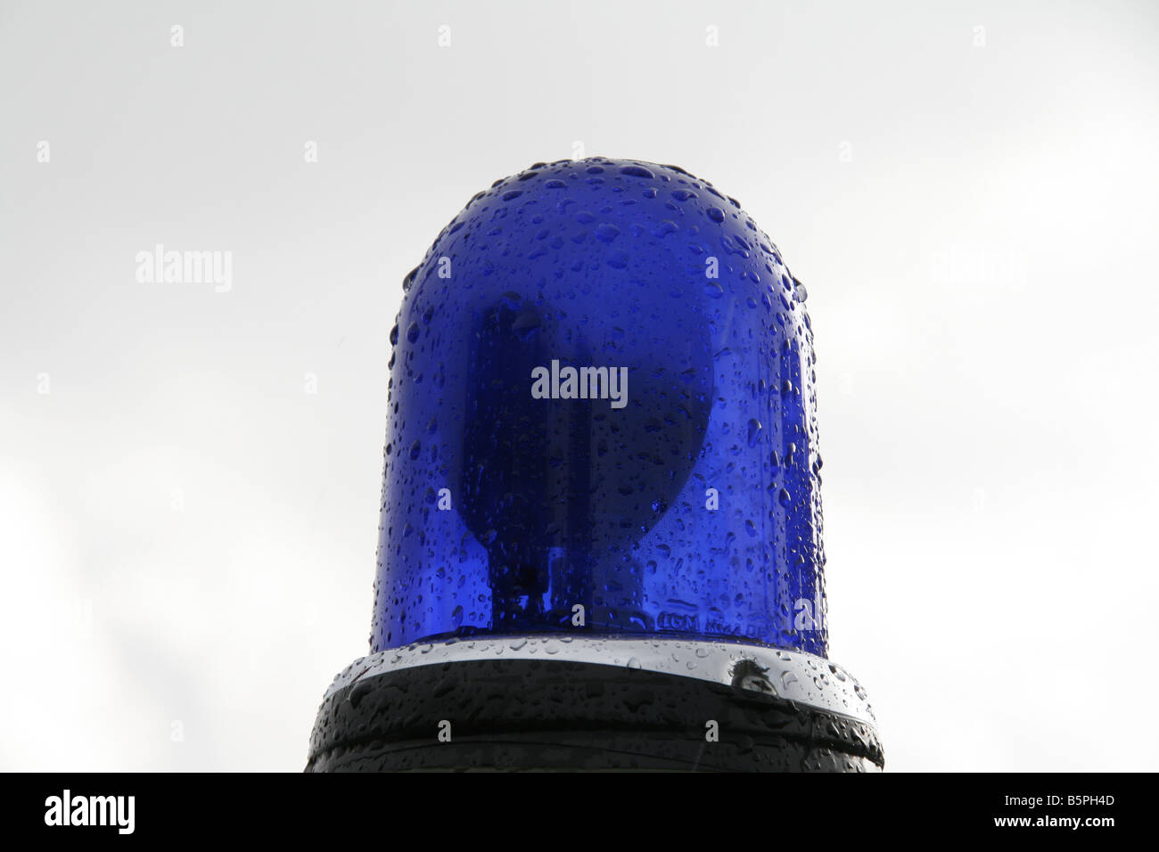 emergency services blue light on police car Stock Photo - Alamy