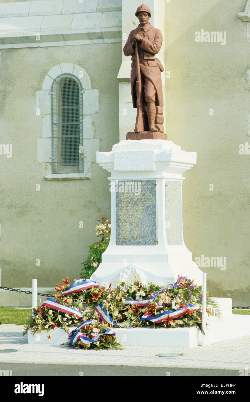 Statue of common soldier, a Poilu, on war memorial in La Tranche-sur ...