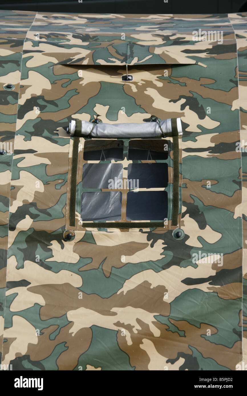 camouflage military army base tent at open day Stock Photo - Alamy