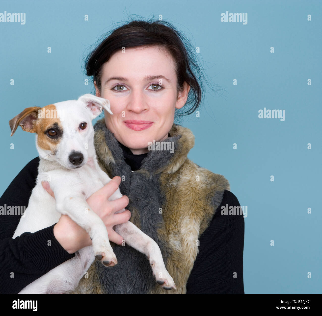 Woman holding Jack Russell dog smiling portrait close up Stock Photo ...