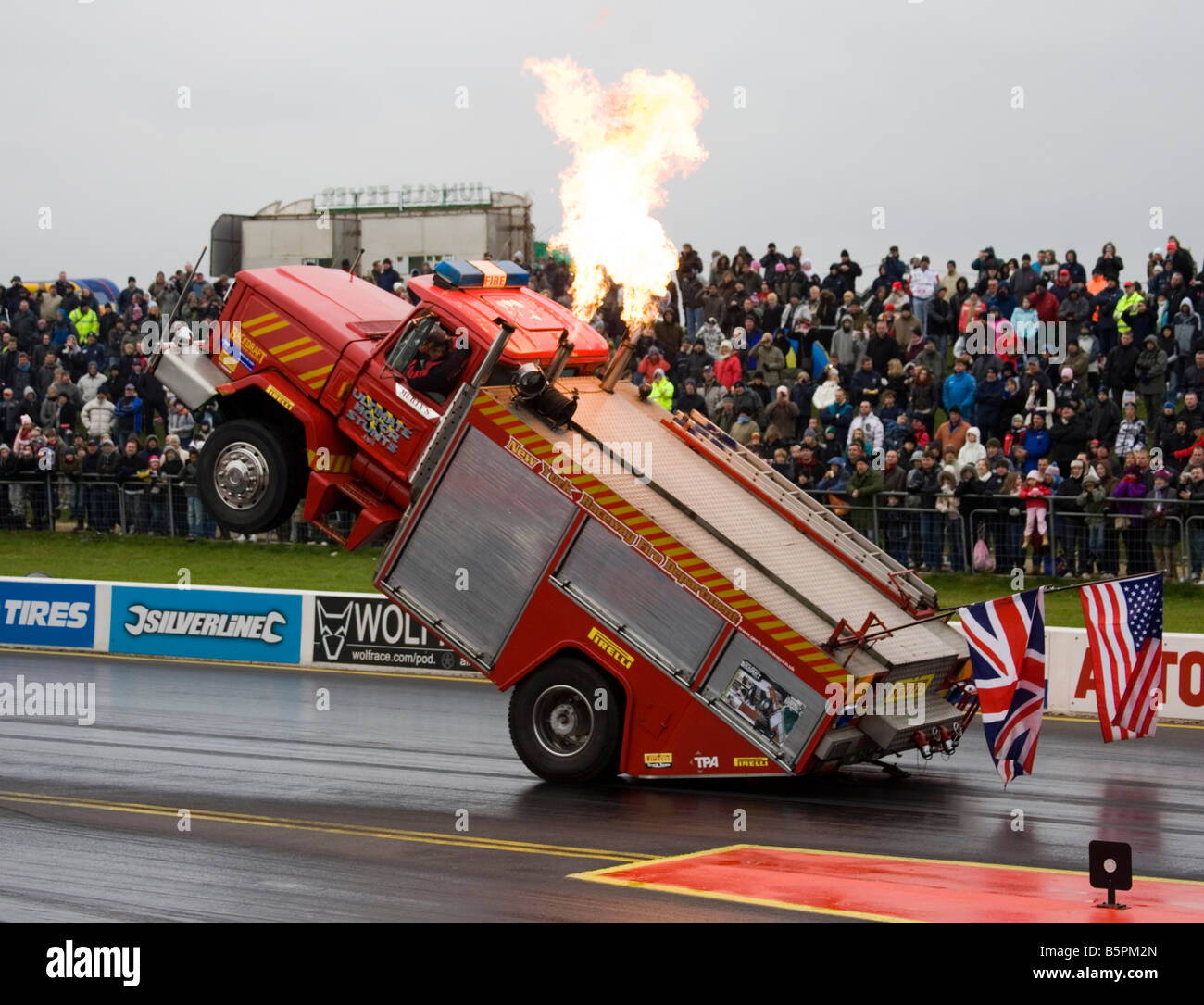 Backdraft wheelie firetruck on two wheels at Santa Pod, England Stock ...