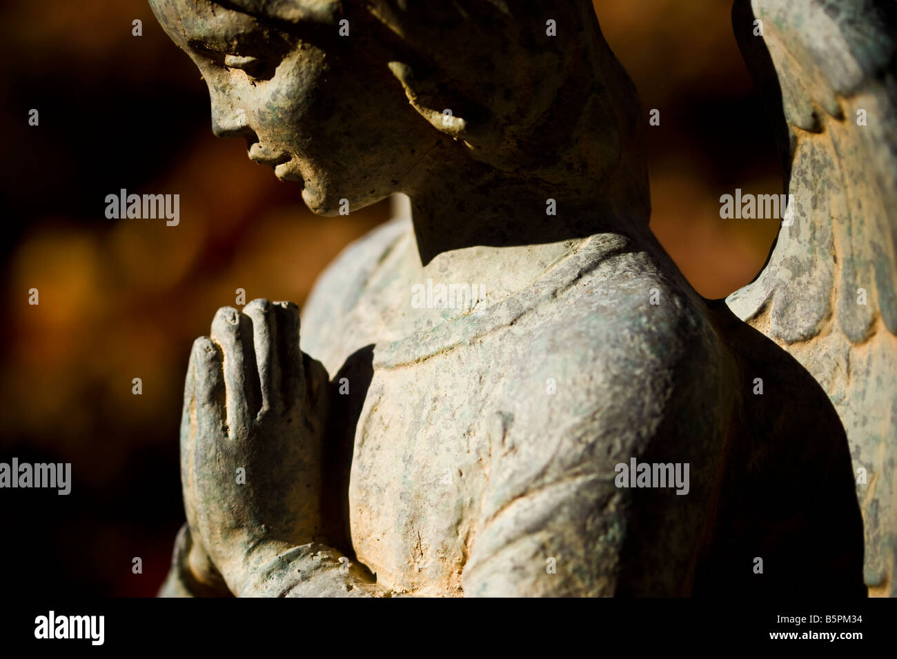 Angel girl praying hi-res stock photography and images - Alamy