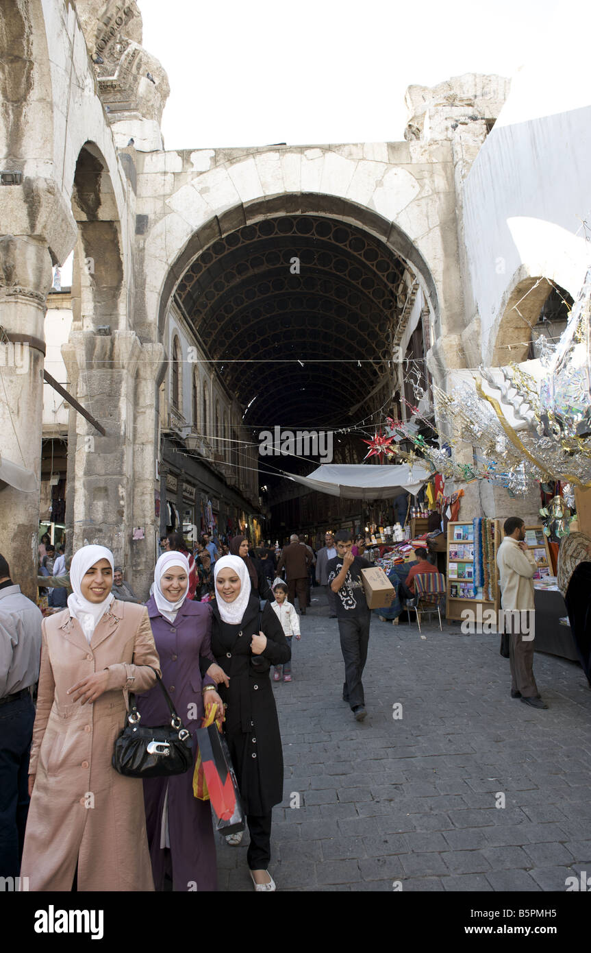 Three young damascan women enjoy a day out in the old town with Western ...