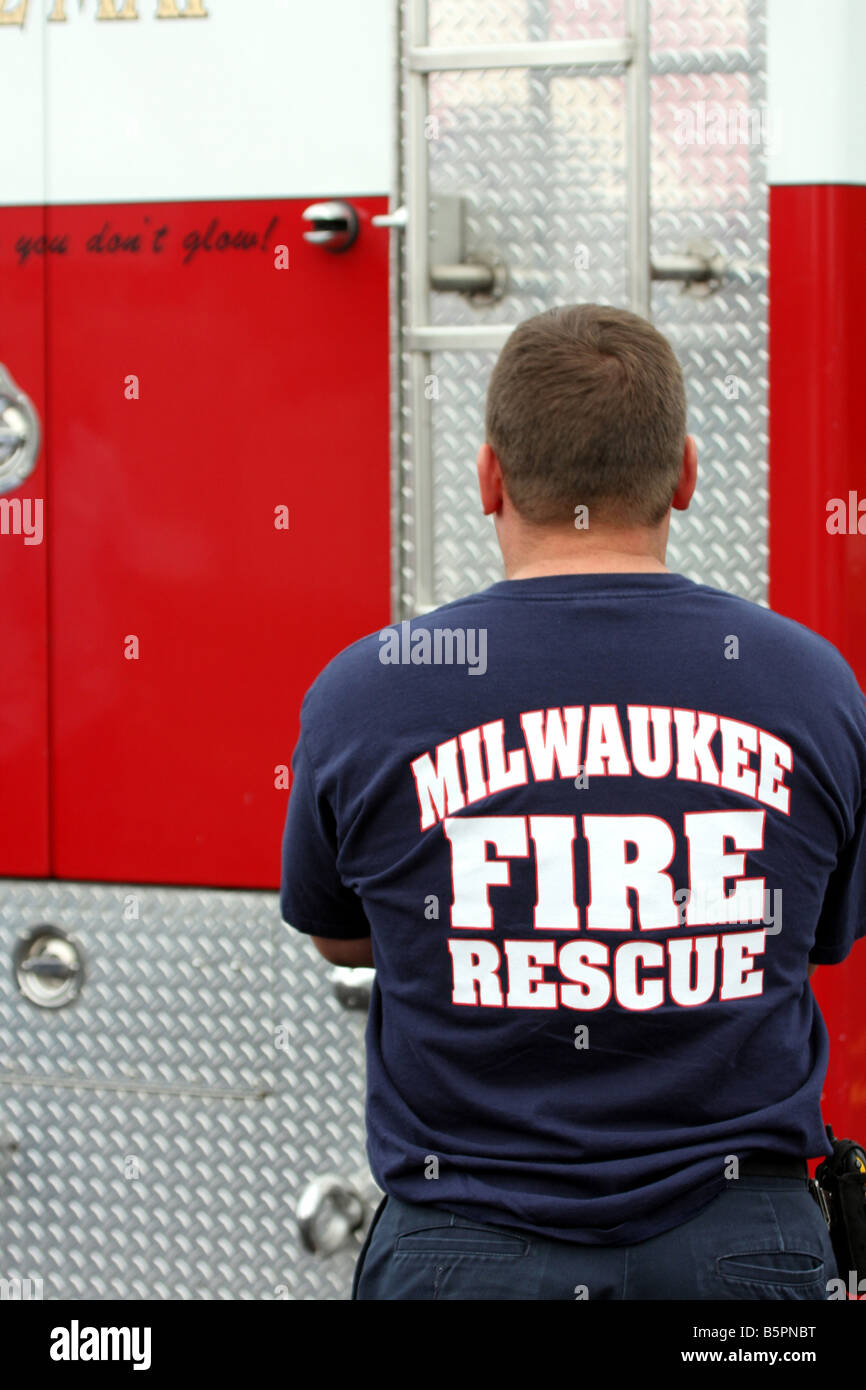 Personnel for the Milwaukee Fire Rescue T shirt standing in front of a ...