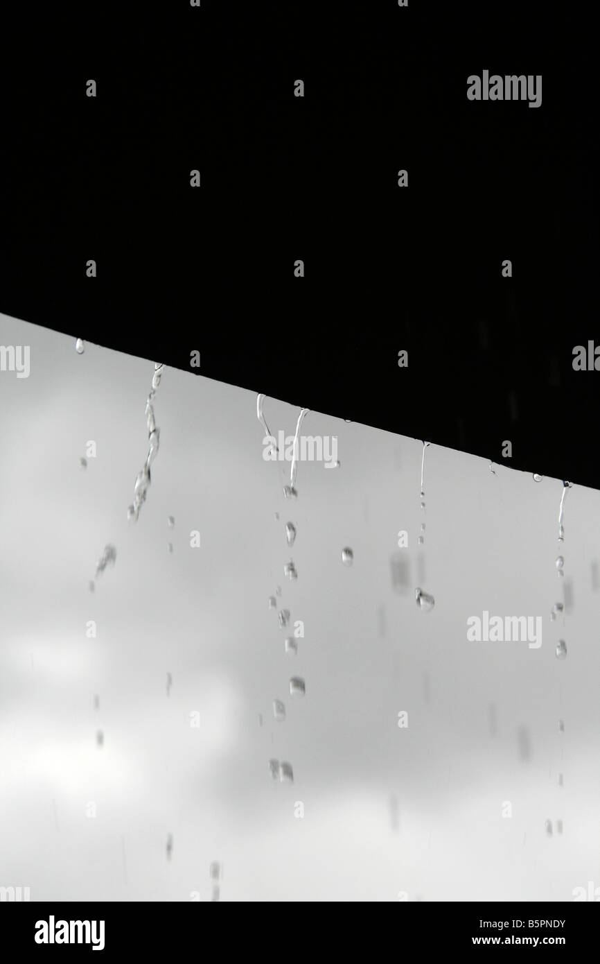 Rain falling off roof hi-res stock photography and images - Alamy