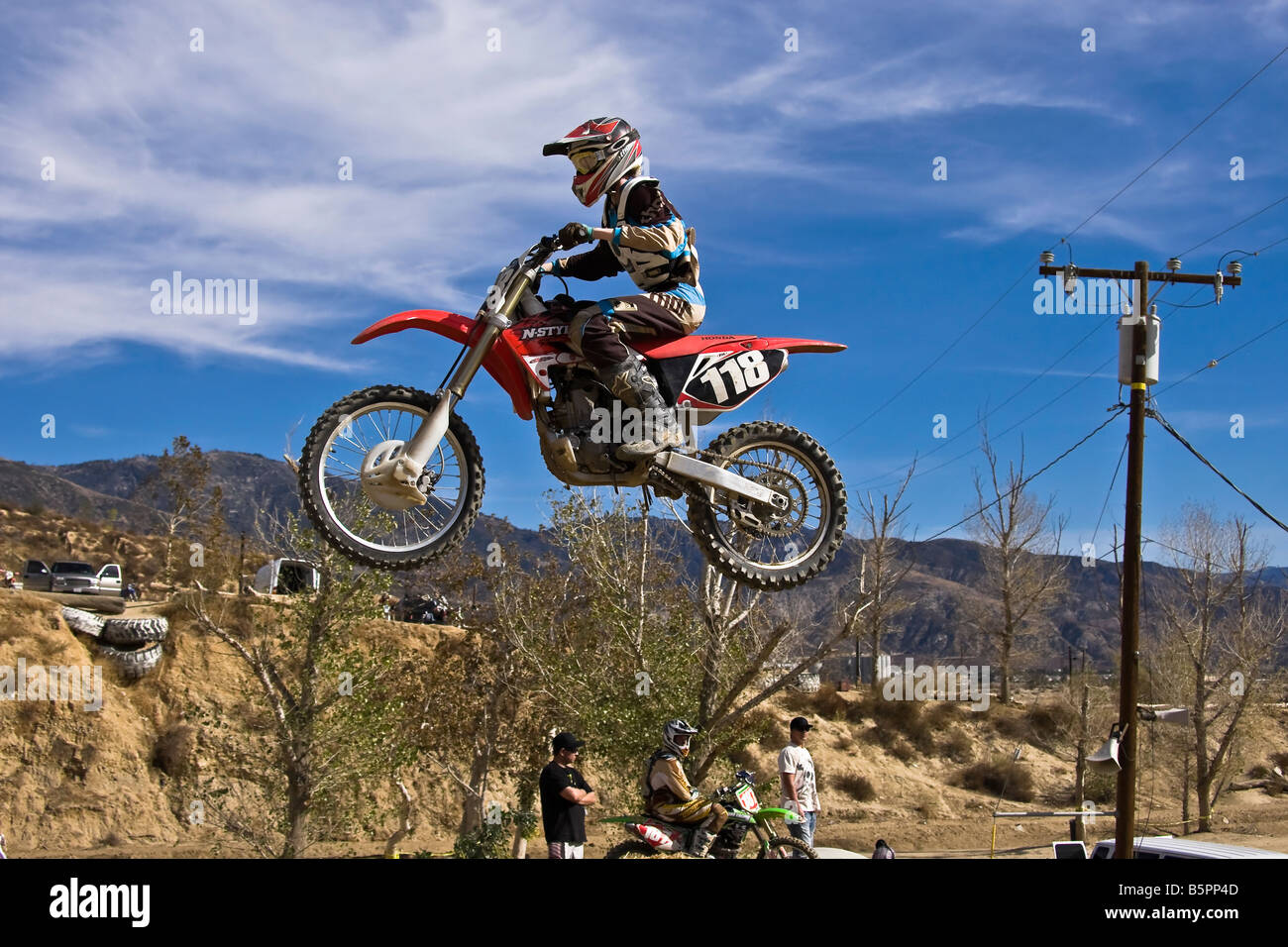 Motorcross rider airborne over jump at Glen Helen circuit Devore ...