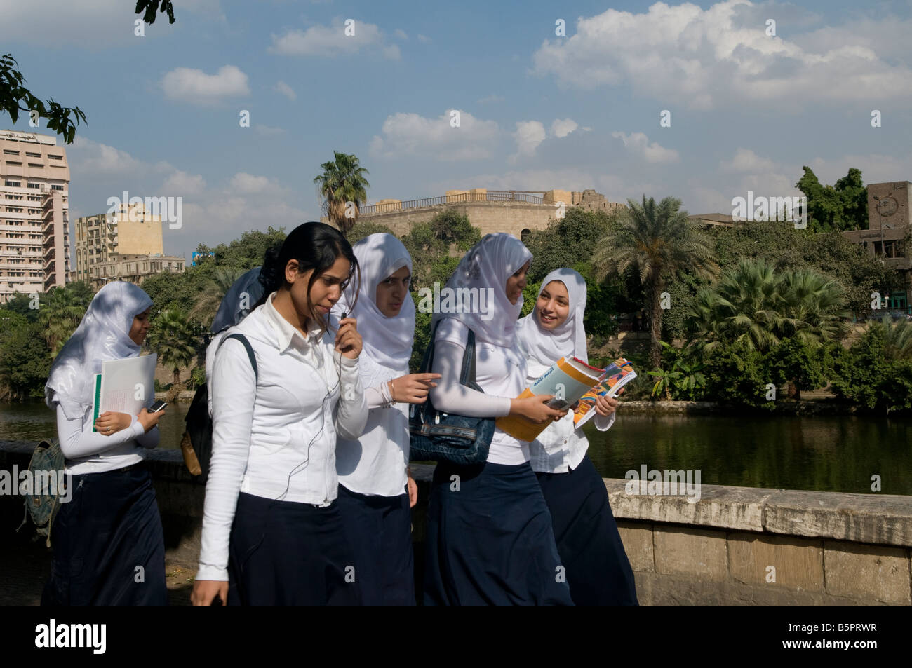 Young Egyptian female students wearing traditional Hijab headscarf ...