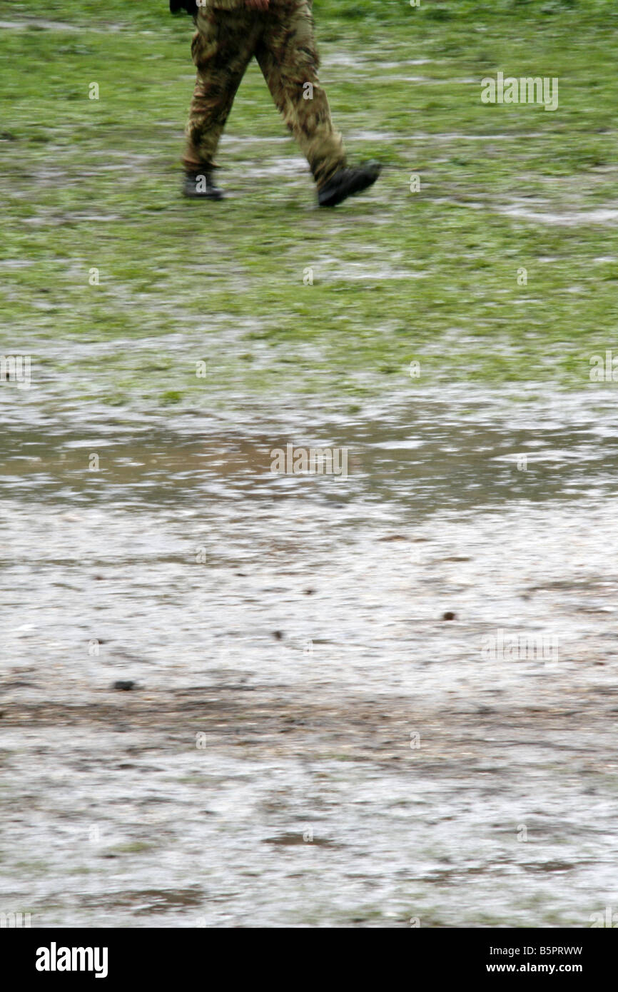 one single soldier feet marching on battlefield Stock Photo - Alamy