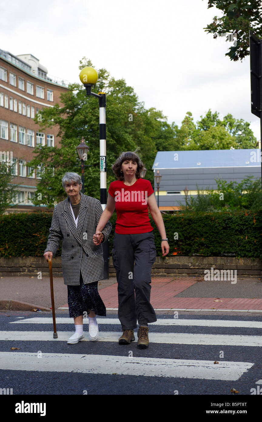 Children Helping The Elderly Cross The Road