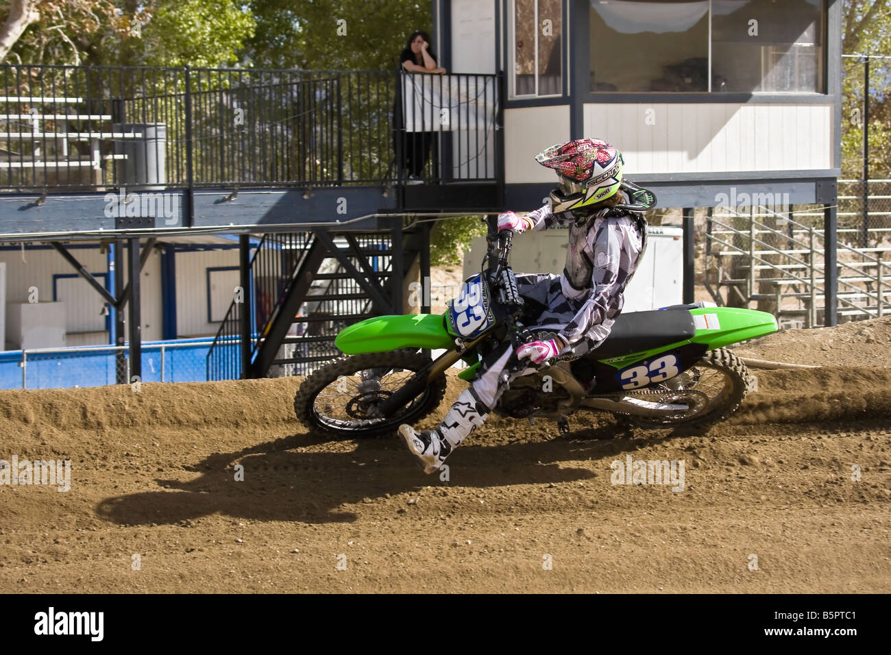 Motorcross rider sweeping through a bend at Glen Helen circuit Devore ...