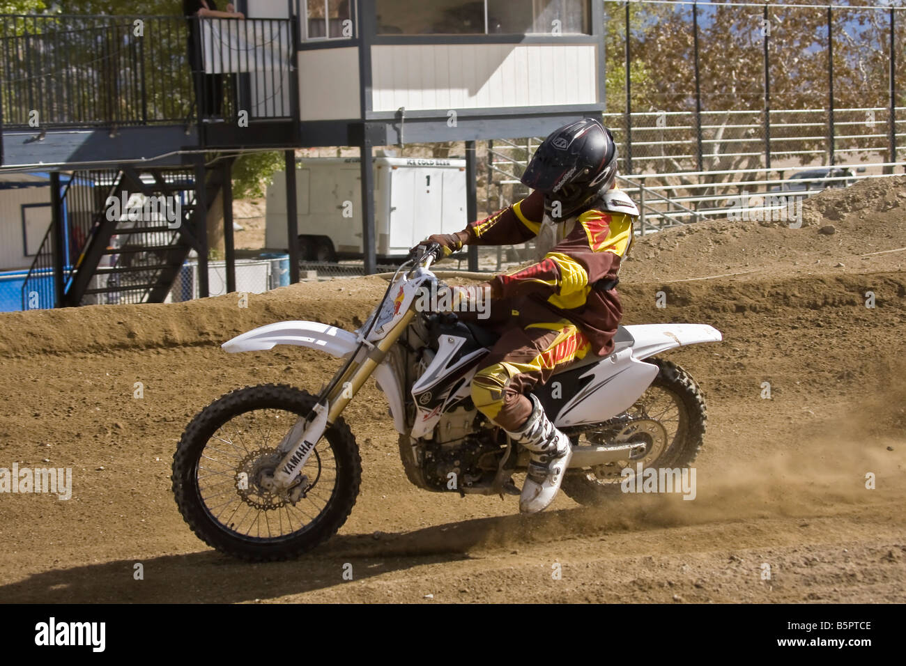 Motorcross rider sweeping through a bend at Glen Helen circuit Devore ...