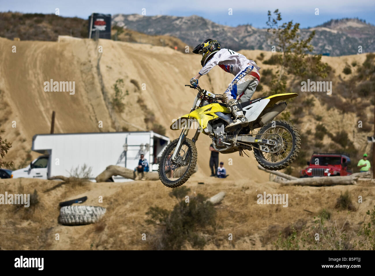 Motorcross rider jumping over a ramp at Glen Helen circuit Devore ...