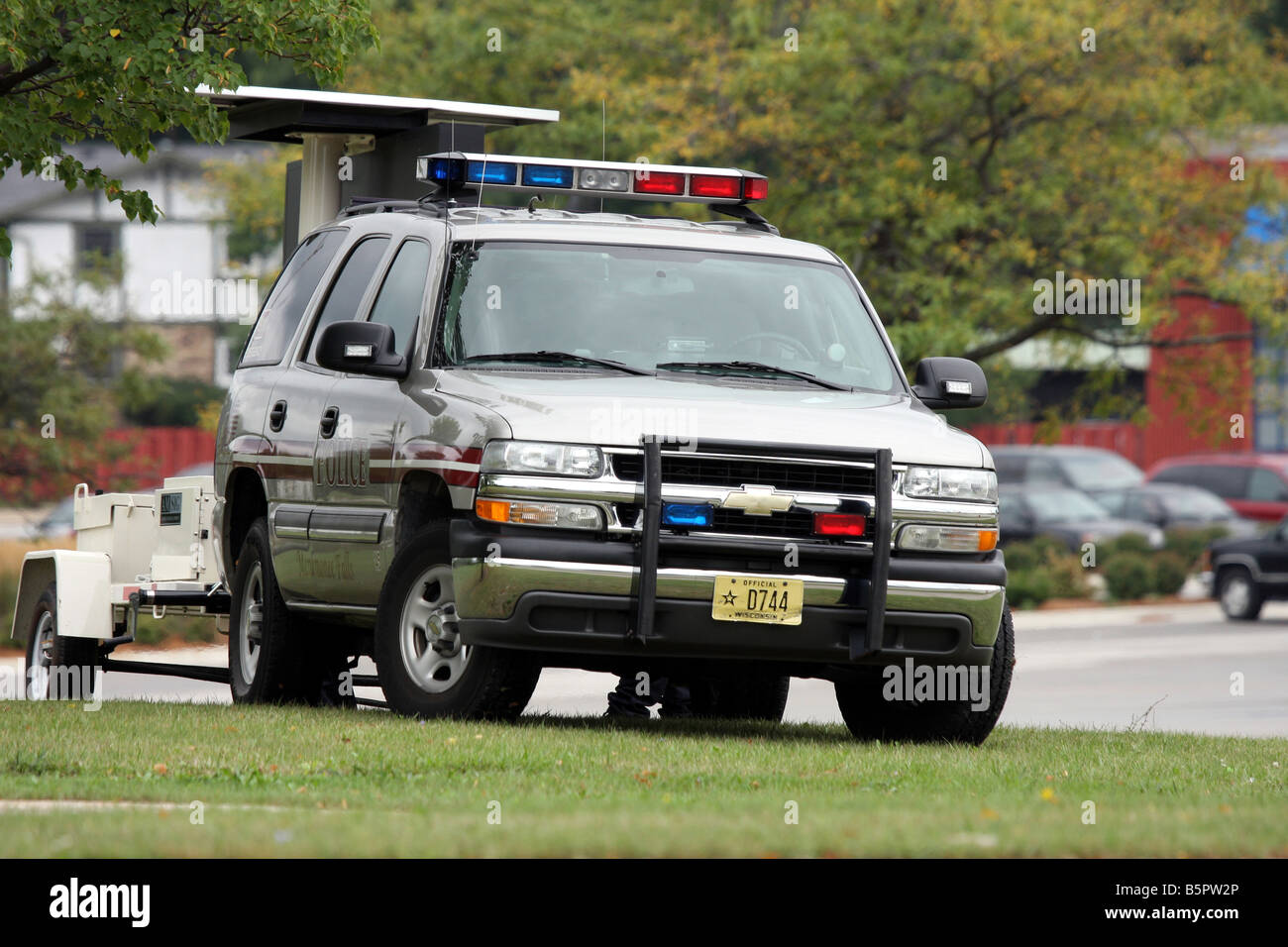 A police vehicle picking up a mobile announcement board Stock Photo - Alamy