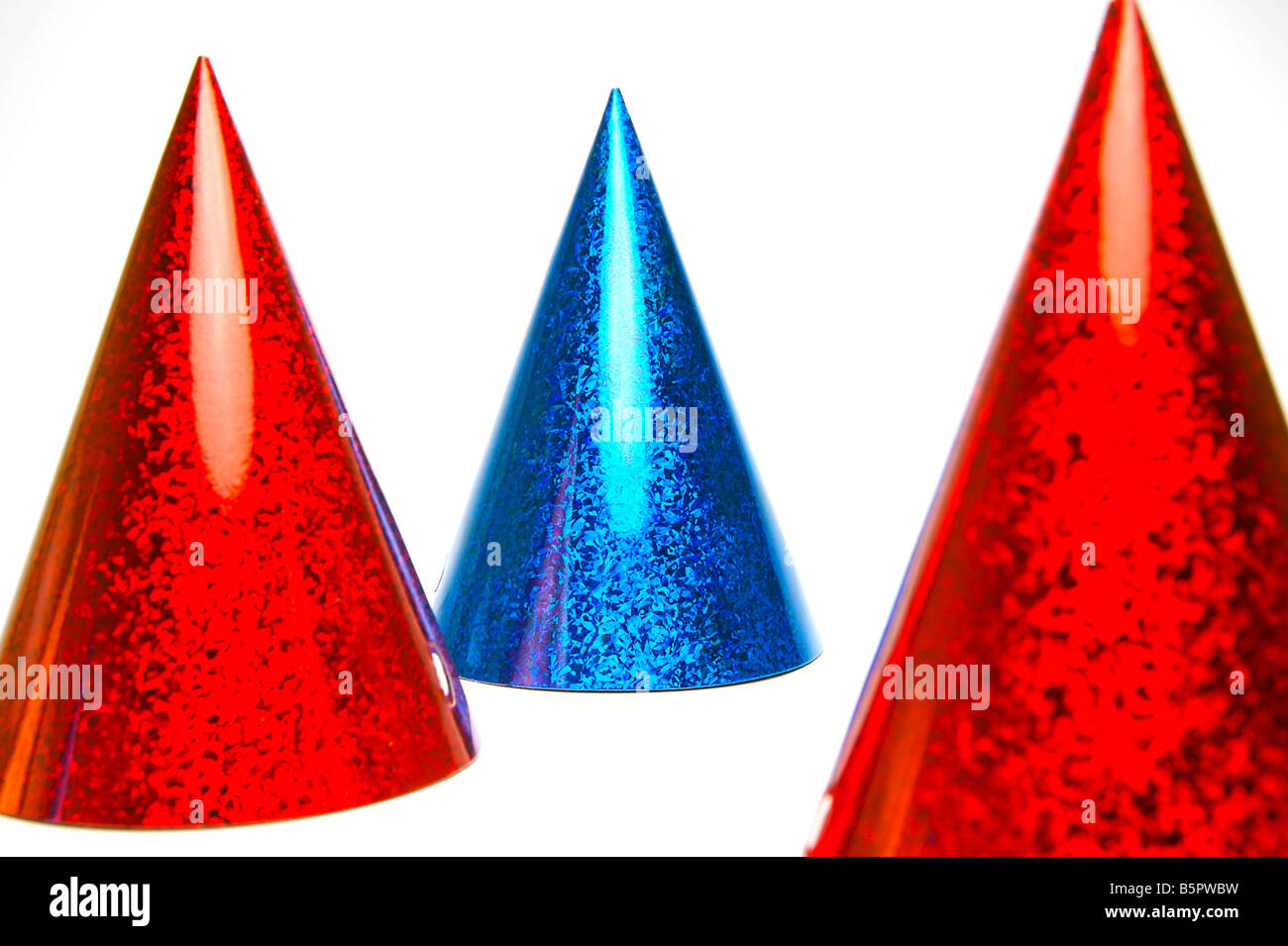 Party hats isolated against a white background Stock Photo - Alamy