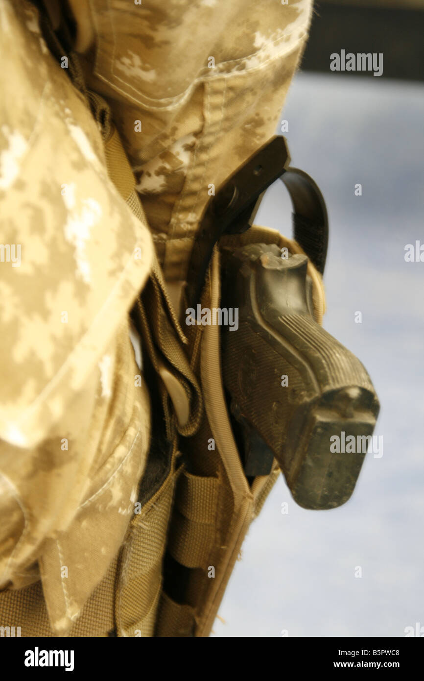 one army soldier man mannequin with handgun weapon Stock Photo - Alamy