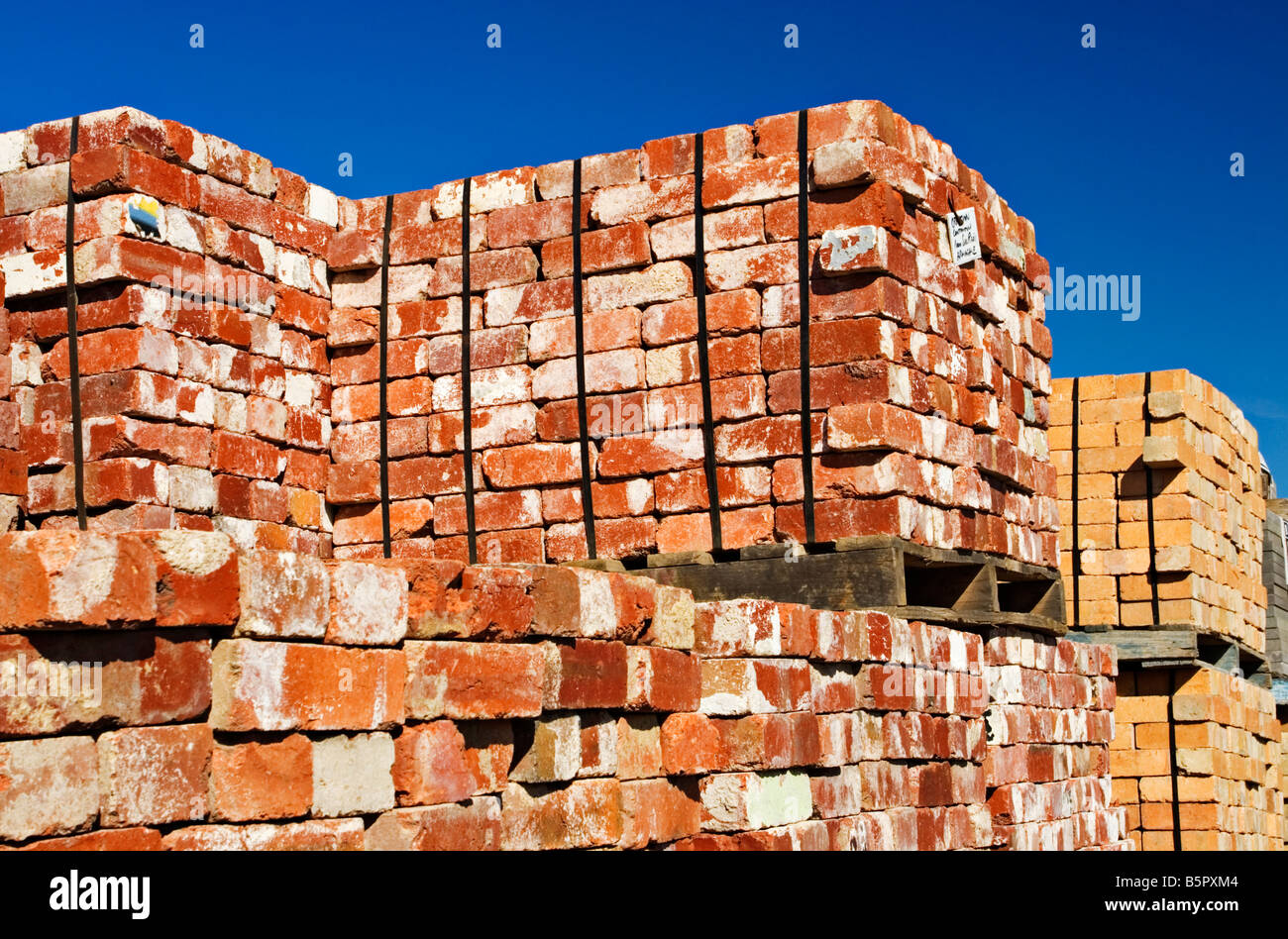 Building Materials / Stacked Pallets of used Building Bricks at a Brick ...