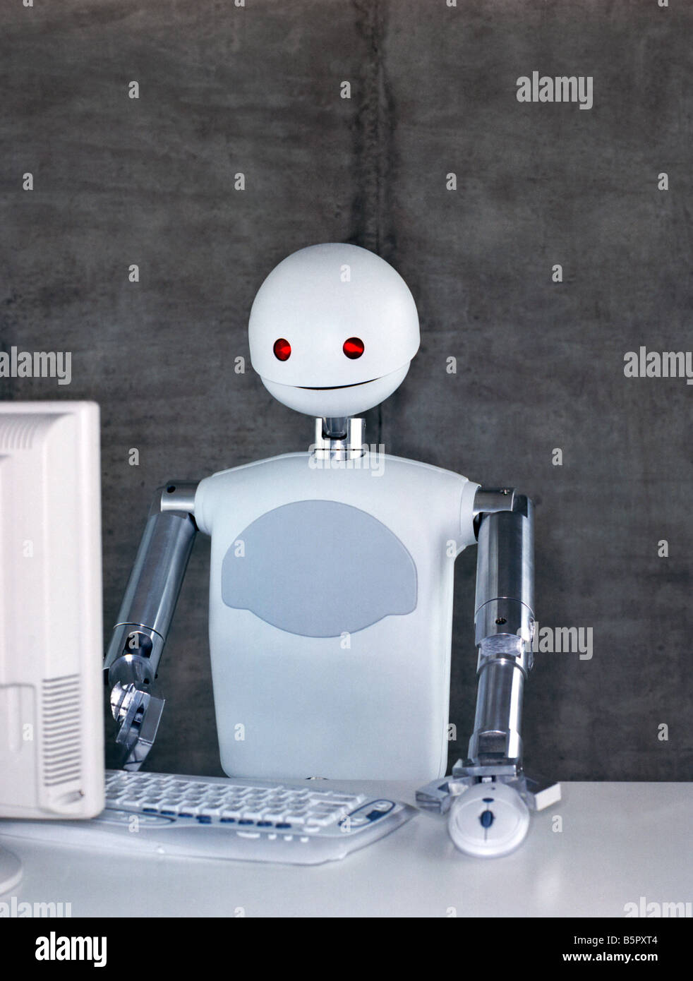 Robot using computer Stock Photo - Alamy