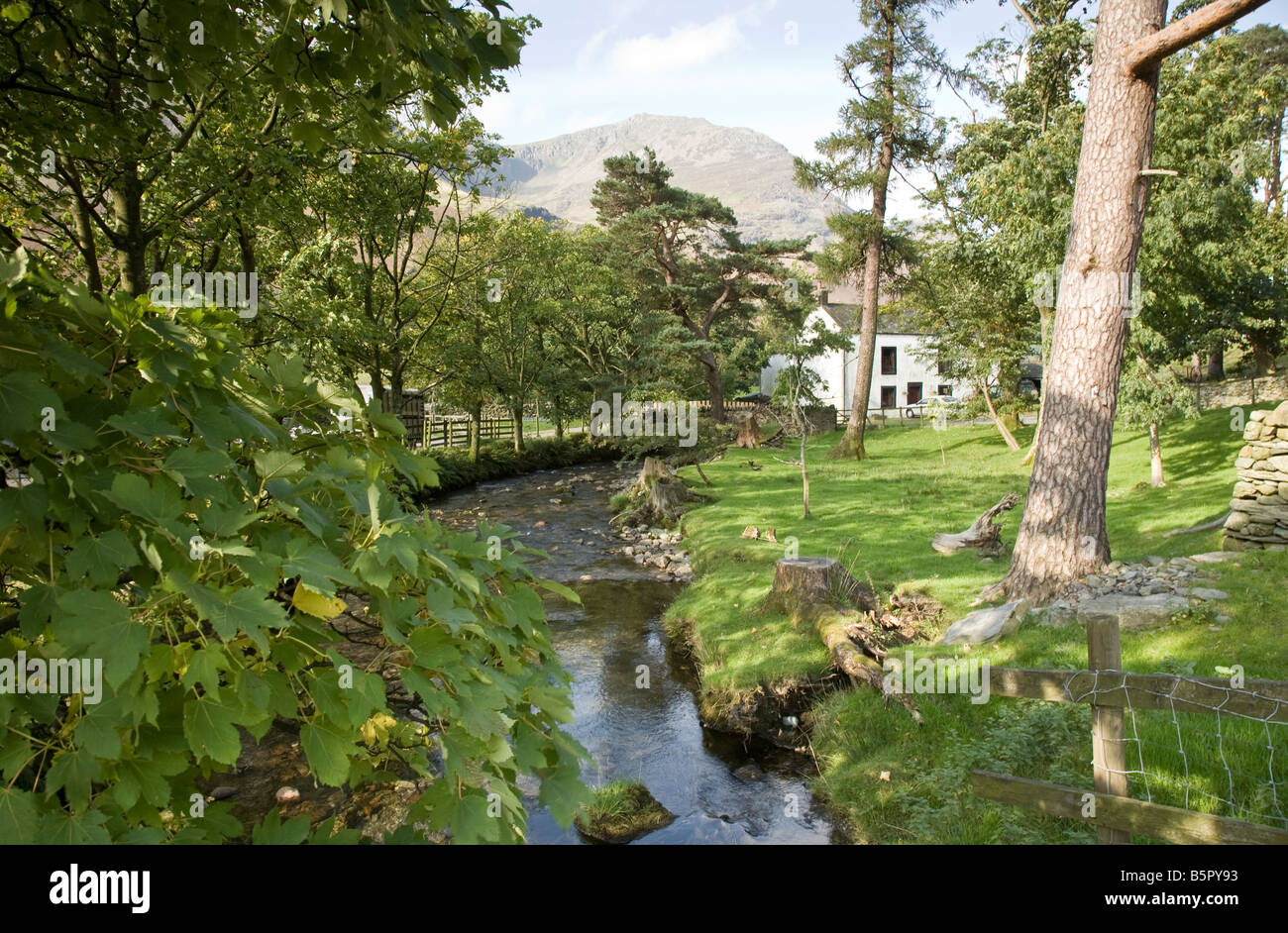 Gatesgarthdale Beck flowing towards Gatesgarth Farm House Stock Photo ...