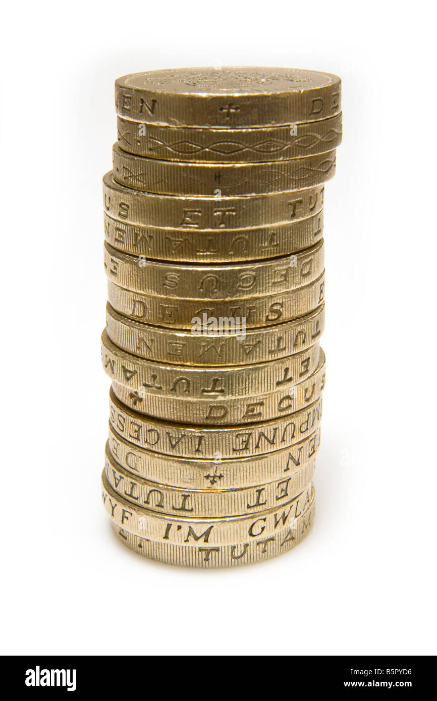 Pound coins isolated on a white studio background Stock Photo - Alamy