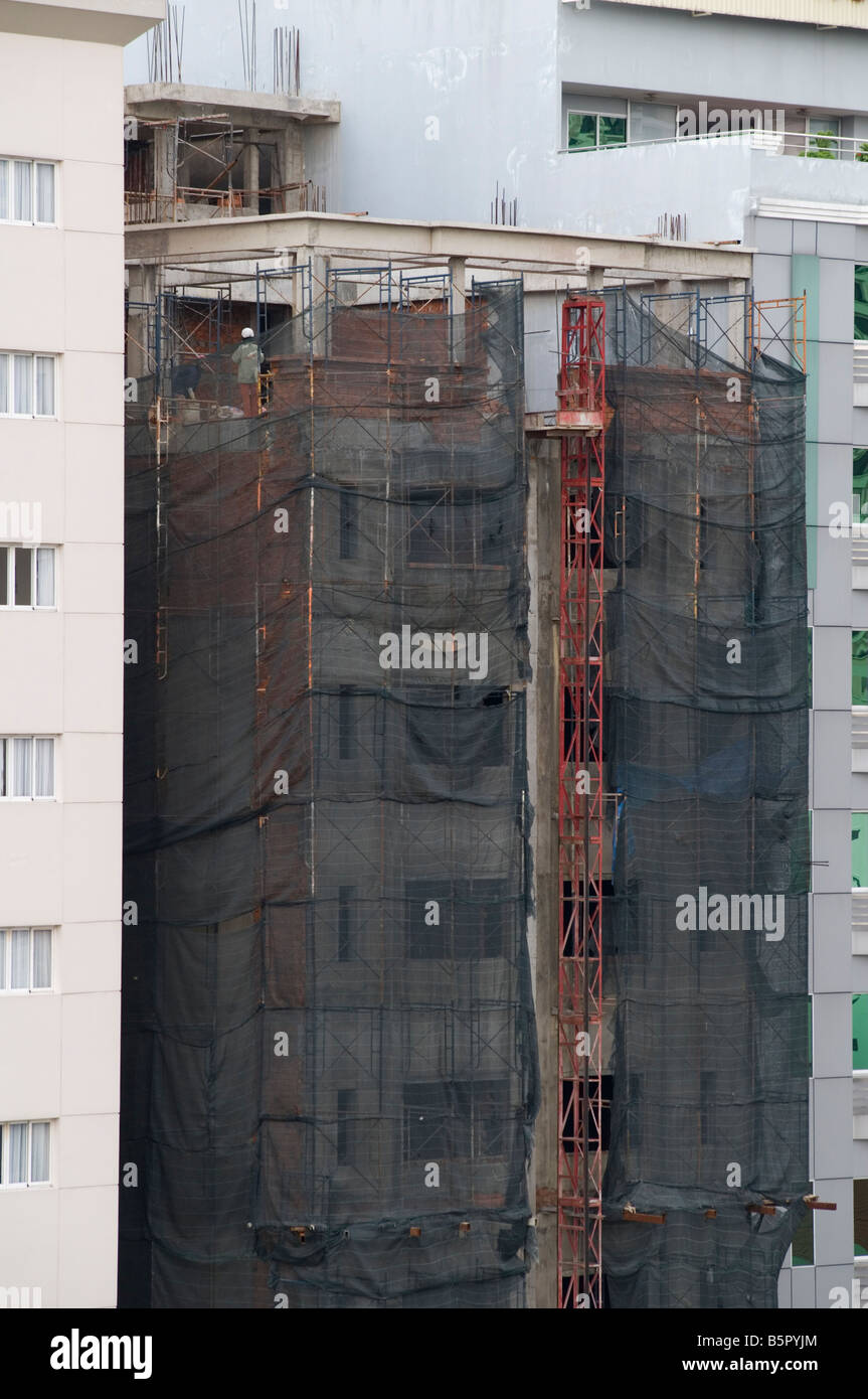 Scaffolding high rise building new construction hi-res stock ...