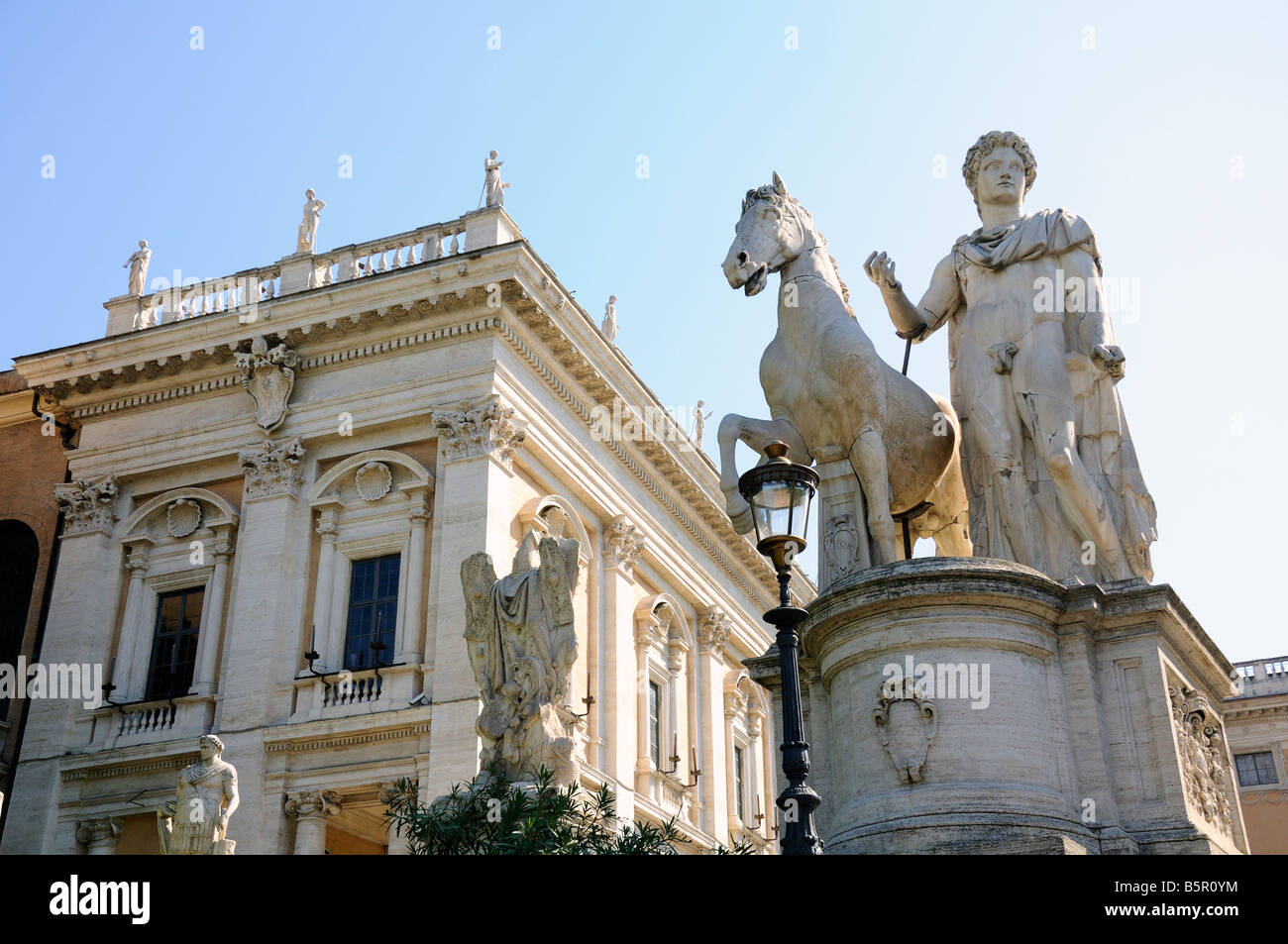 Statues atop the steps to the Capitoline Hill in Rome Stock Photo - Alamy