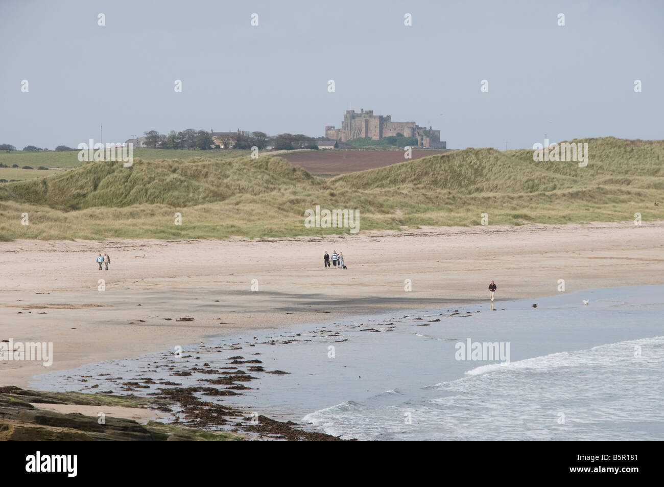 Bamburgh Castle from Seahouses Stock Photo - Alamy
