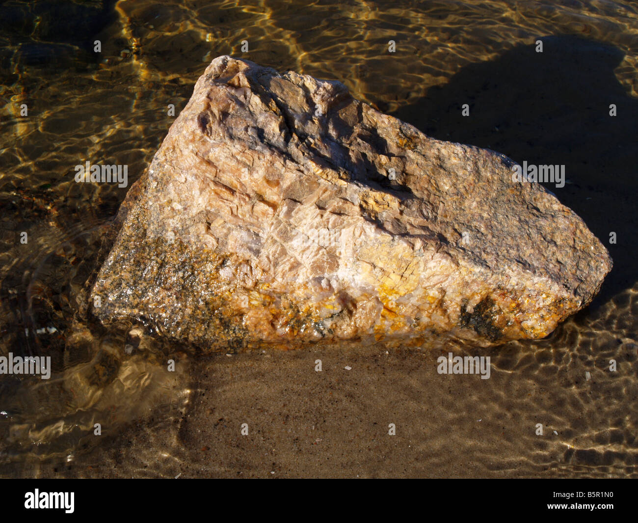 The stone against water background Stock Photo - Alamy