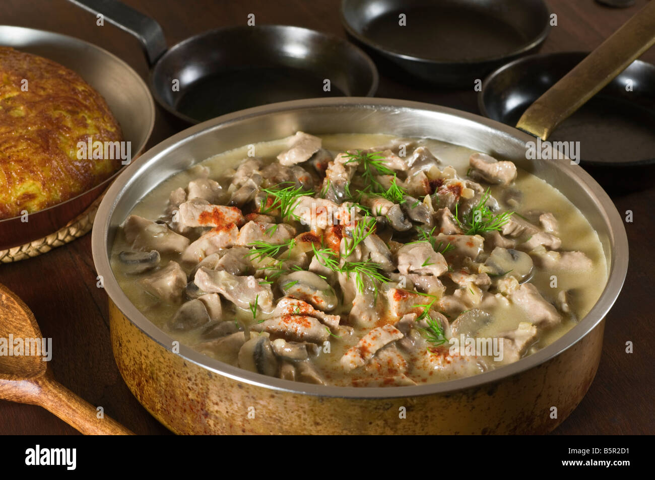 Veal Zurich style with rosti potatoes Switzerland Food Stock Photo - Alamy