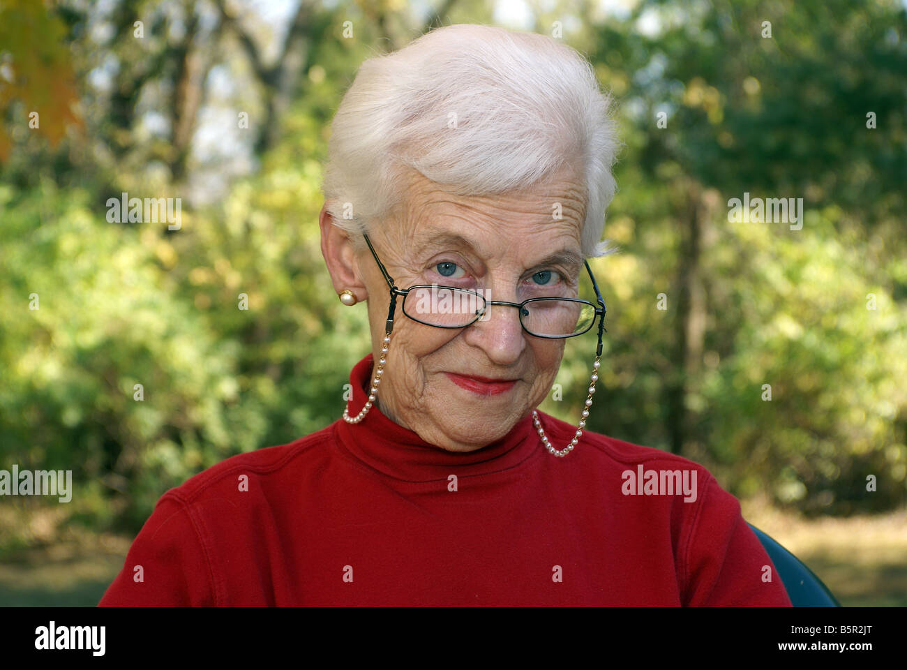 Blue eyes slight smile hi-res stock photography and images - Alamy