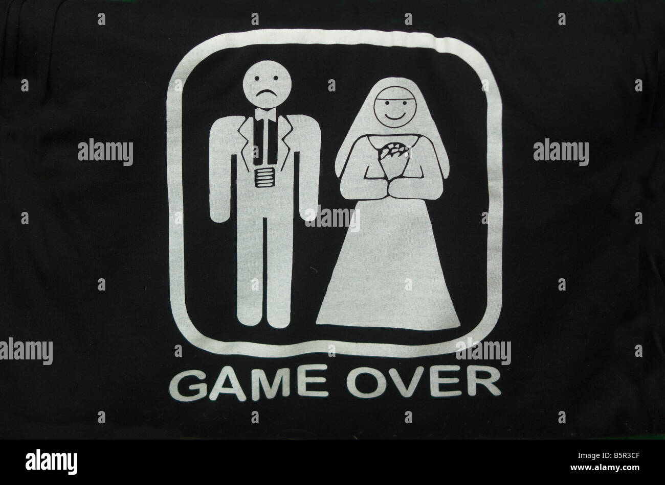 Detail of a T shirt with a wedding and the words Game Over Stock Photo ...
