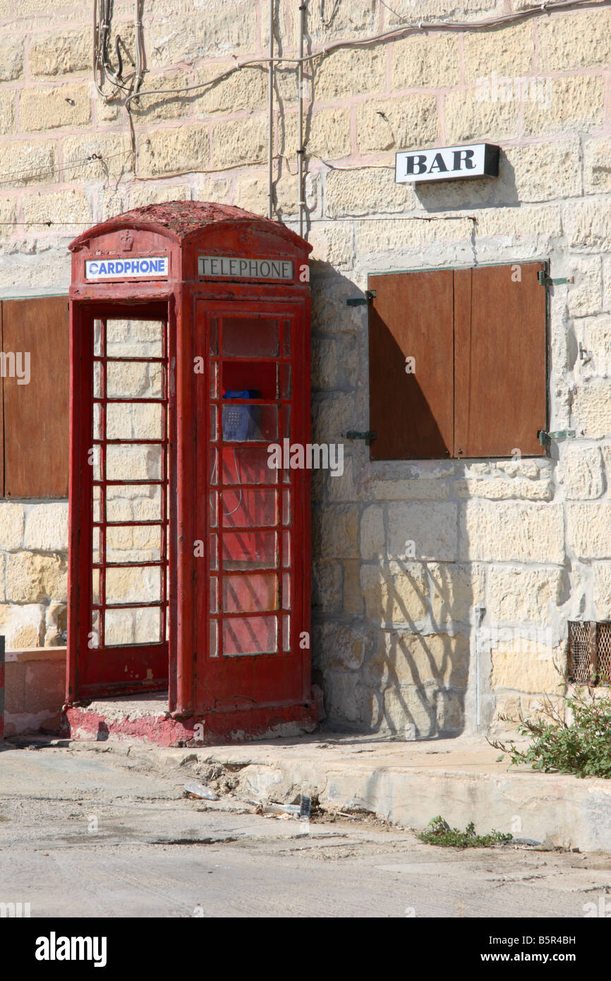 An old British phone box in the "St Thomas Bay" village, Malta Stock ...