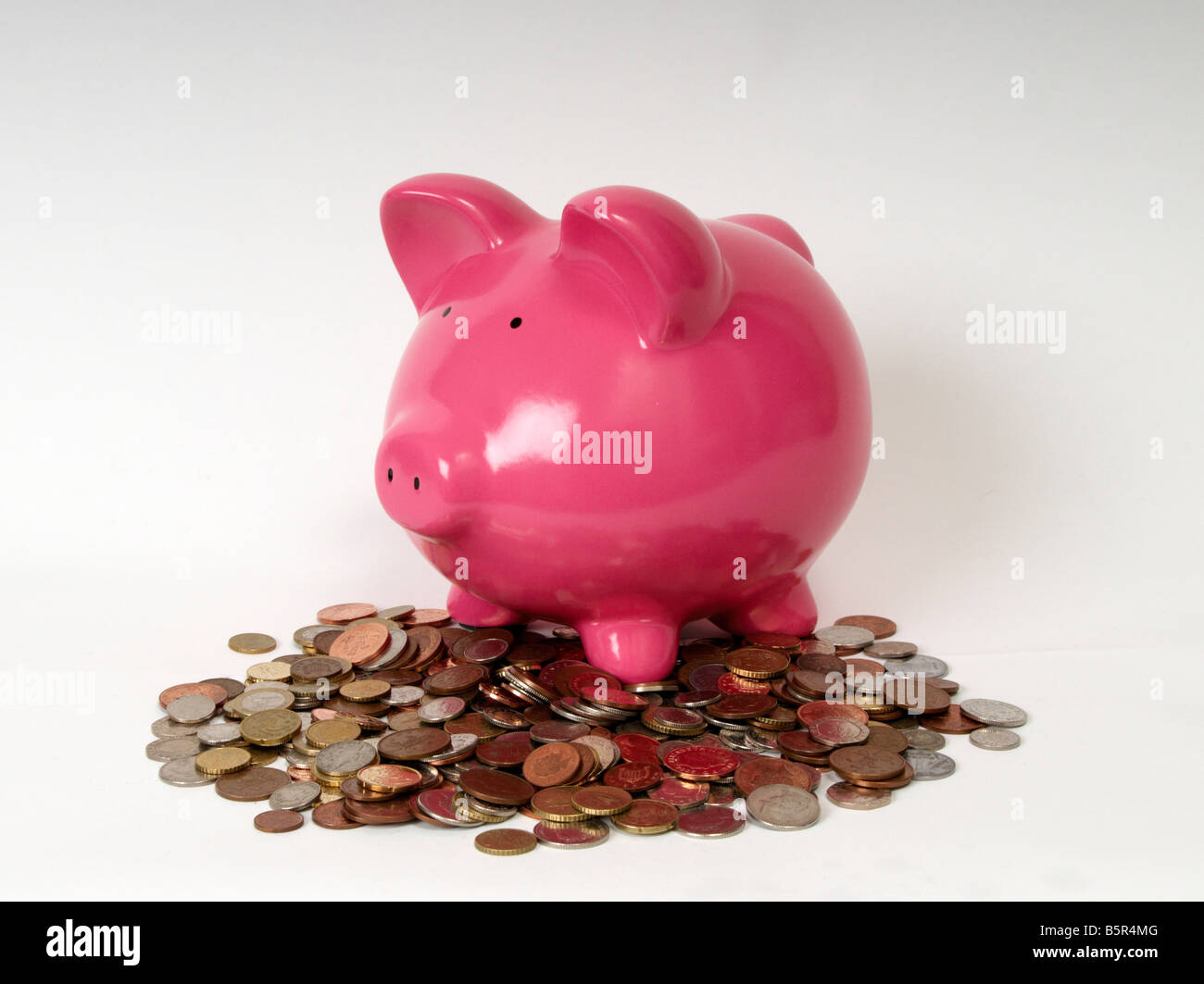 Piggy bank coins hi-res stock photography and images - Alamy