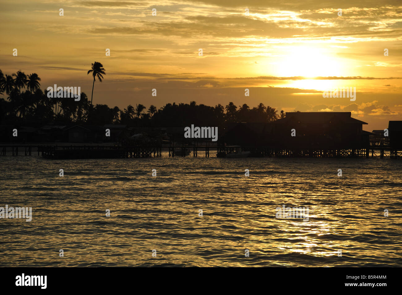 Golden sunset over Sipadan Water Village, Mabul Island, Semporna, Sabah ...