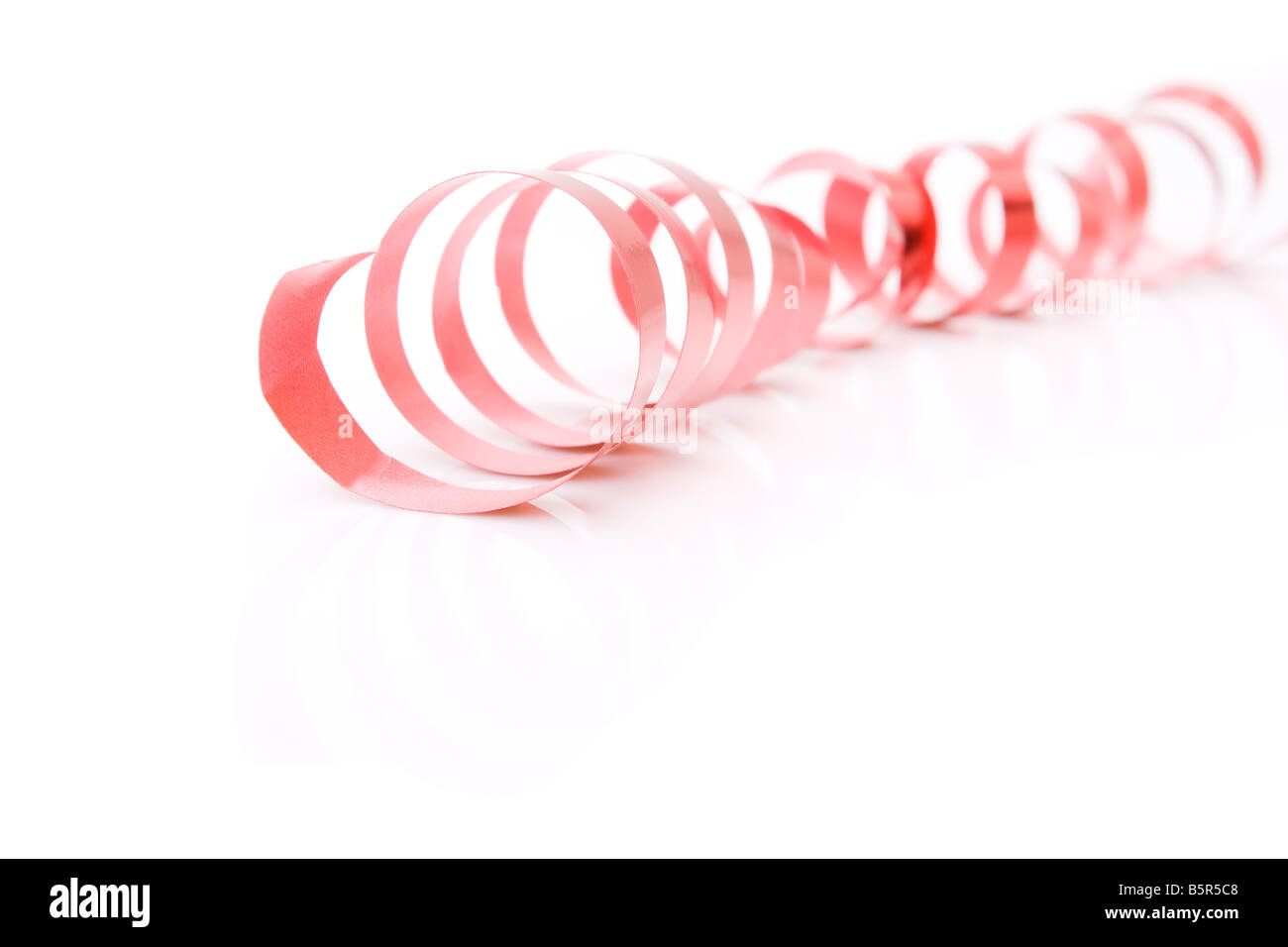 Bright red ribbon isolated on white background Stock Photo - Alamy