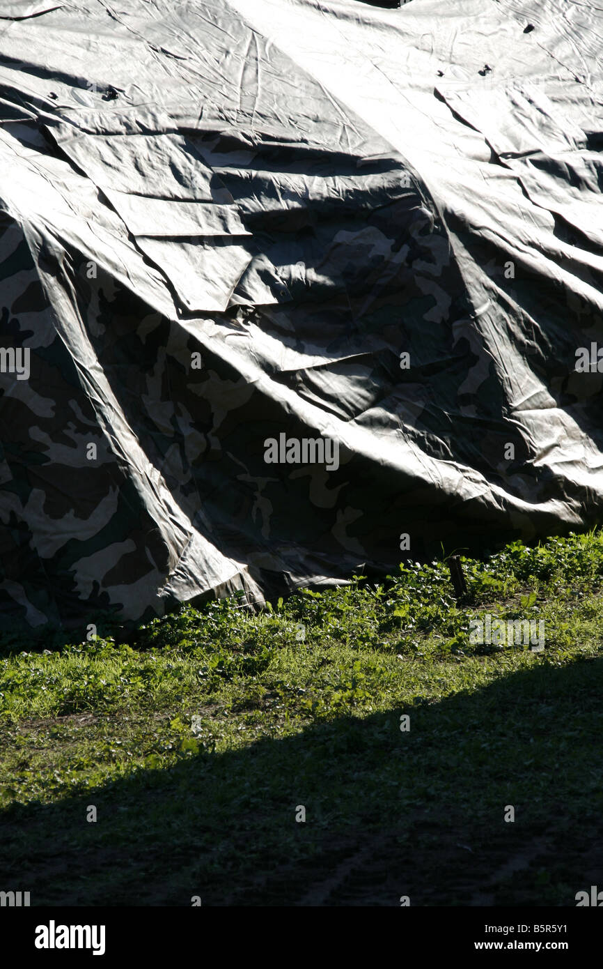 camouflage military army base tent at open day Stock Photo - Alamy