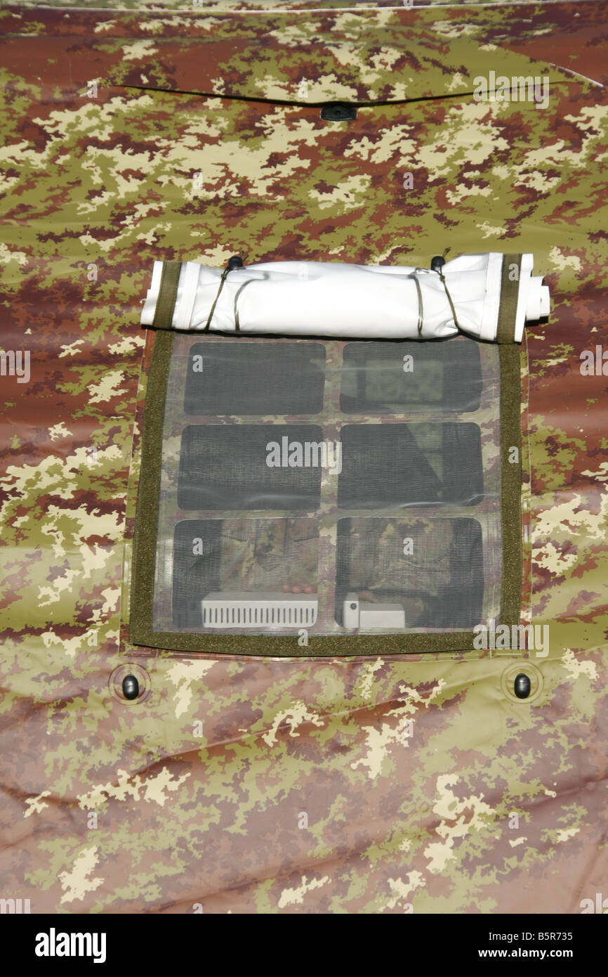 camouflage military army base tent at open day Stock Photo - Alamy