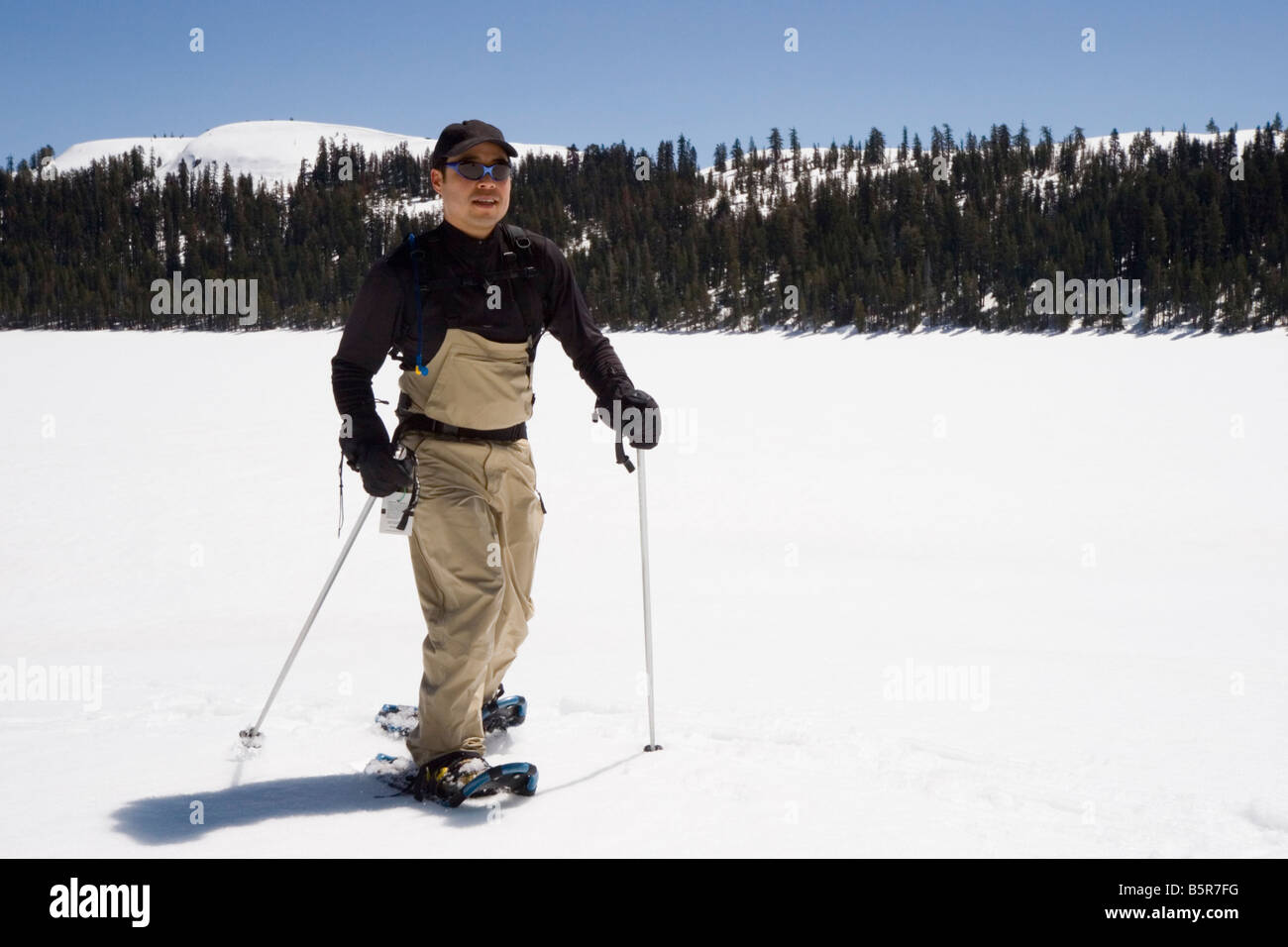 Snowshoeing on Alpine Lake near Bear Valley in the Sierra Nevada ...