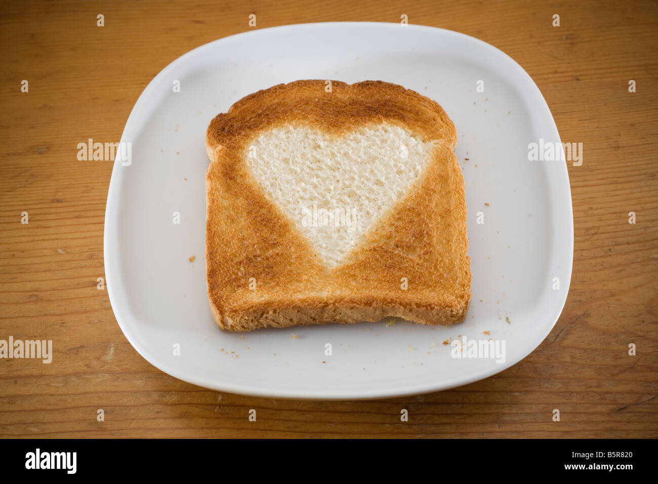 Toast with a heart pattern on it Stock Photo - Alamy