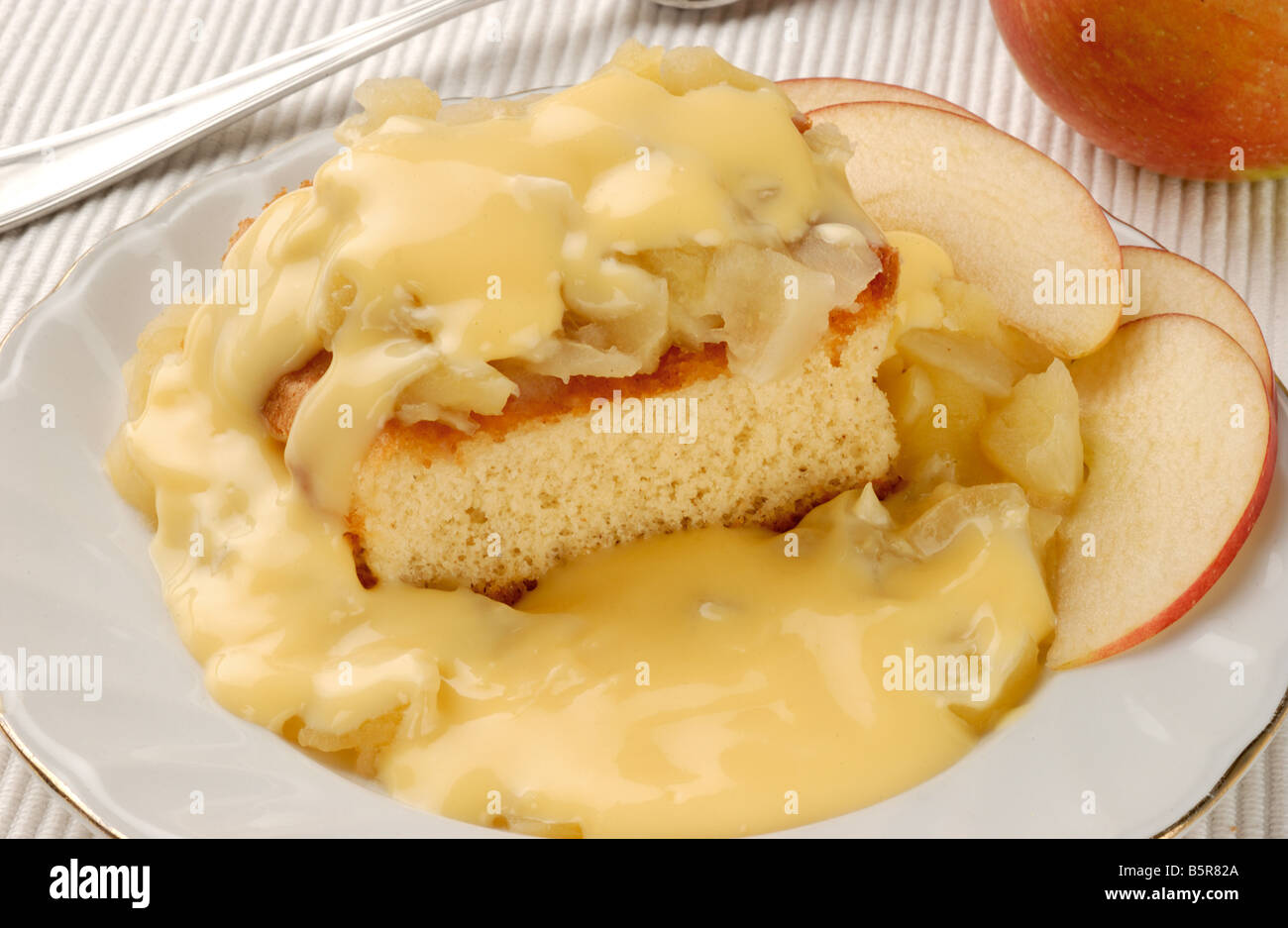 Apple Pudding & Custard Stock Photo - Alamy