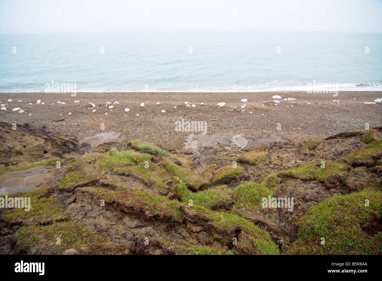 erosion eroding erode melting thaw thawing permafrost land dirt surf ...