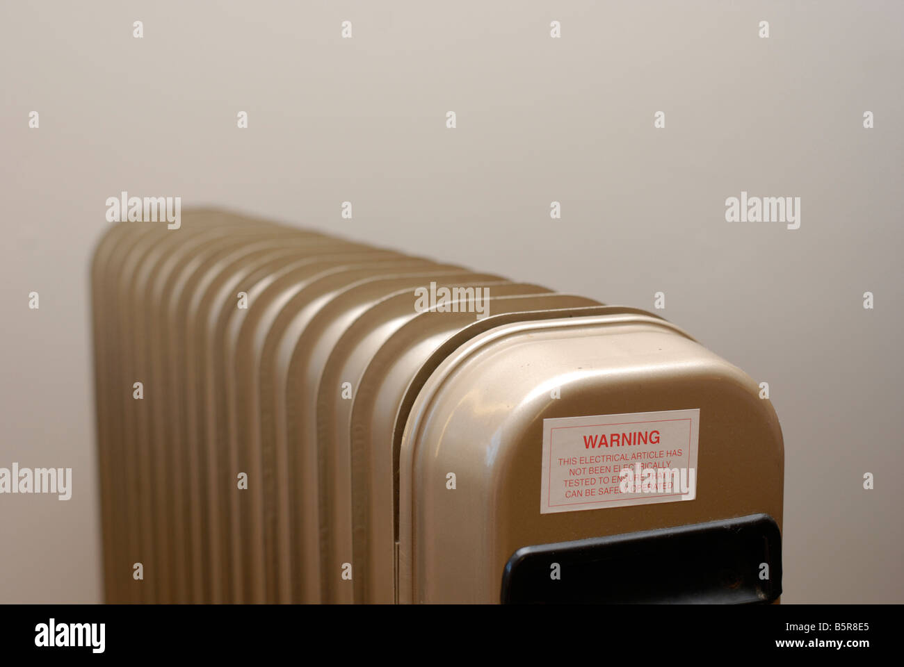 A safety warning sticker on a radiator being sold second hand Stock ...