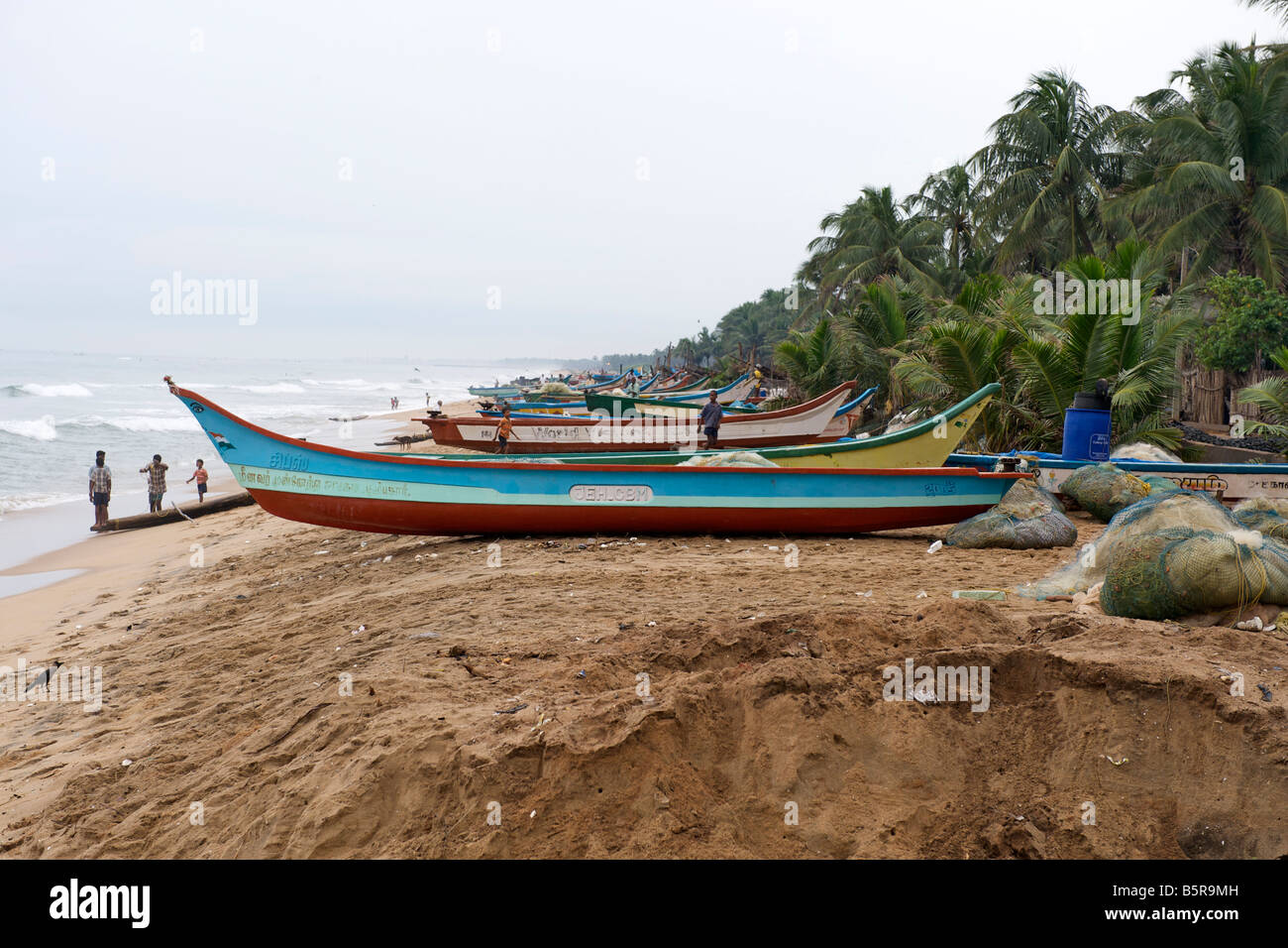 Fishing boats on Kalapet beach near Pondicherry India Stock Photo - Alamy