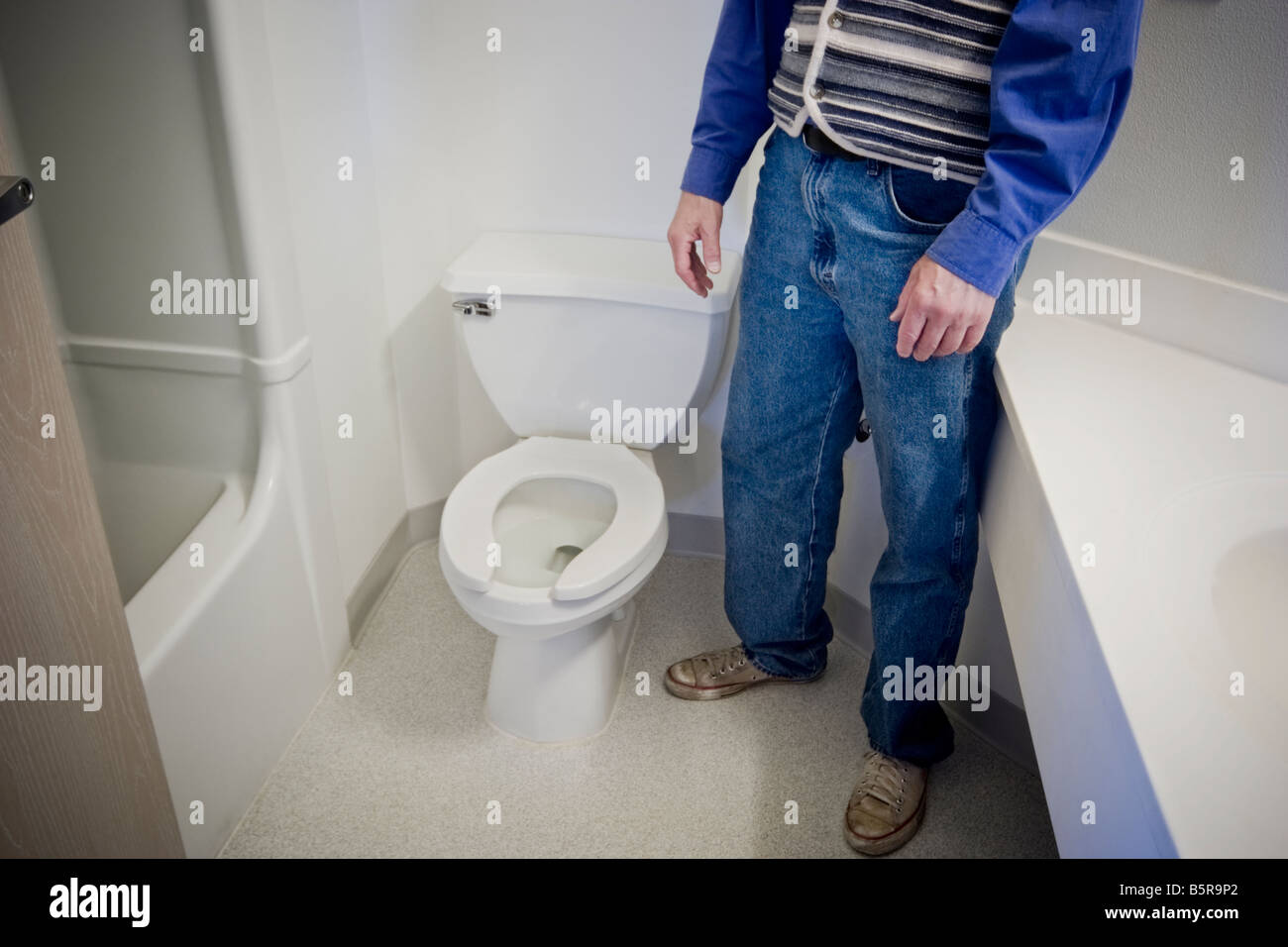 Man Standing Toilet